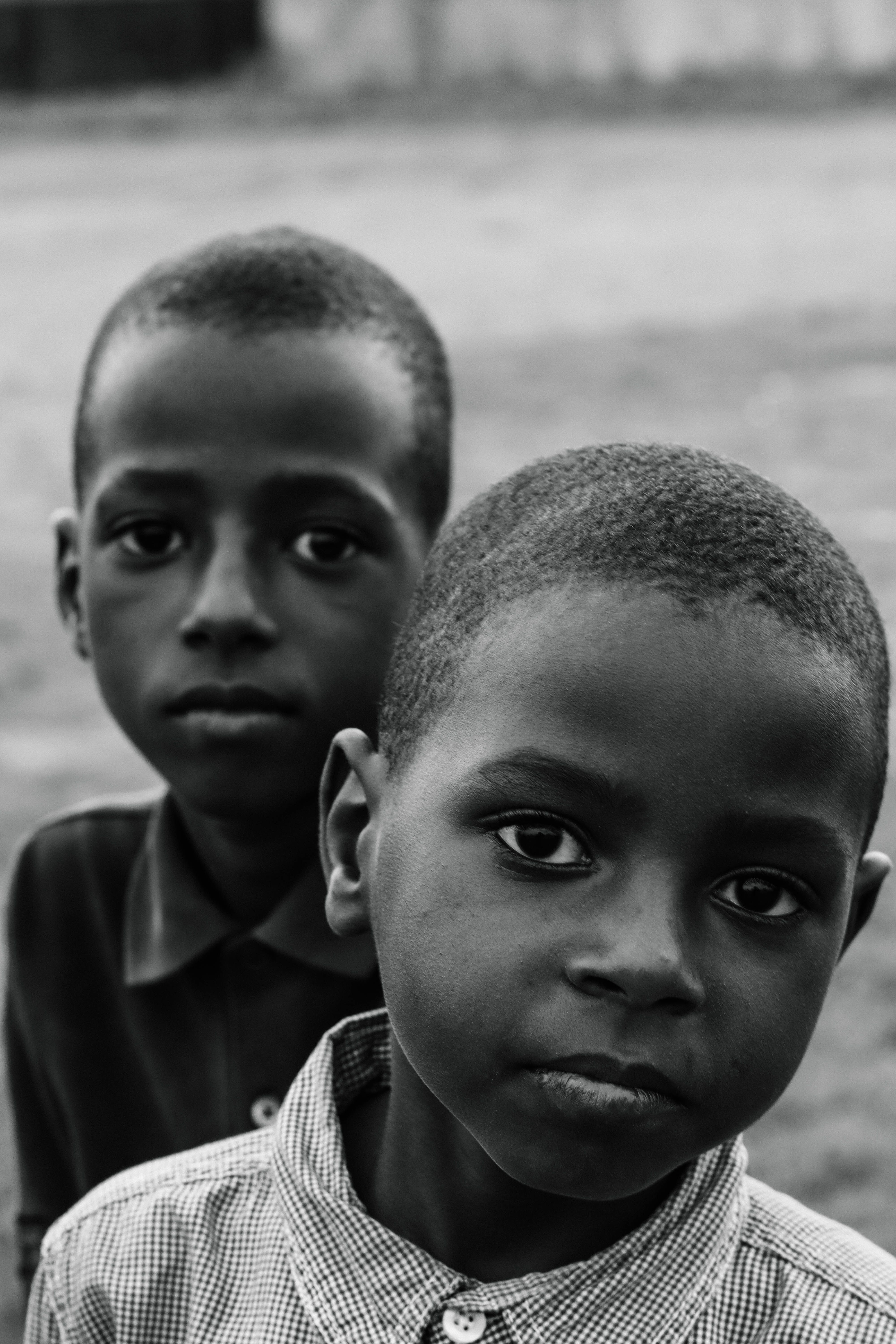 Boys Standing Next to a Tree · Free Stock Photo