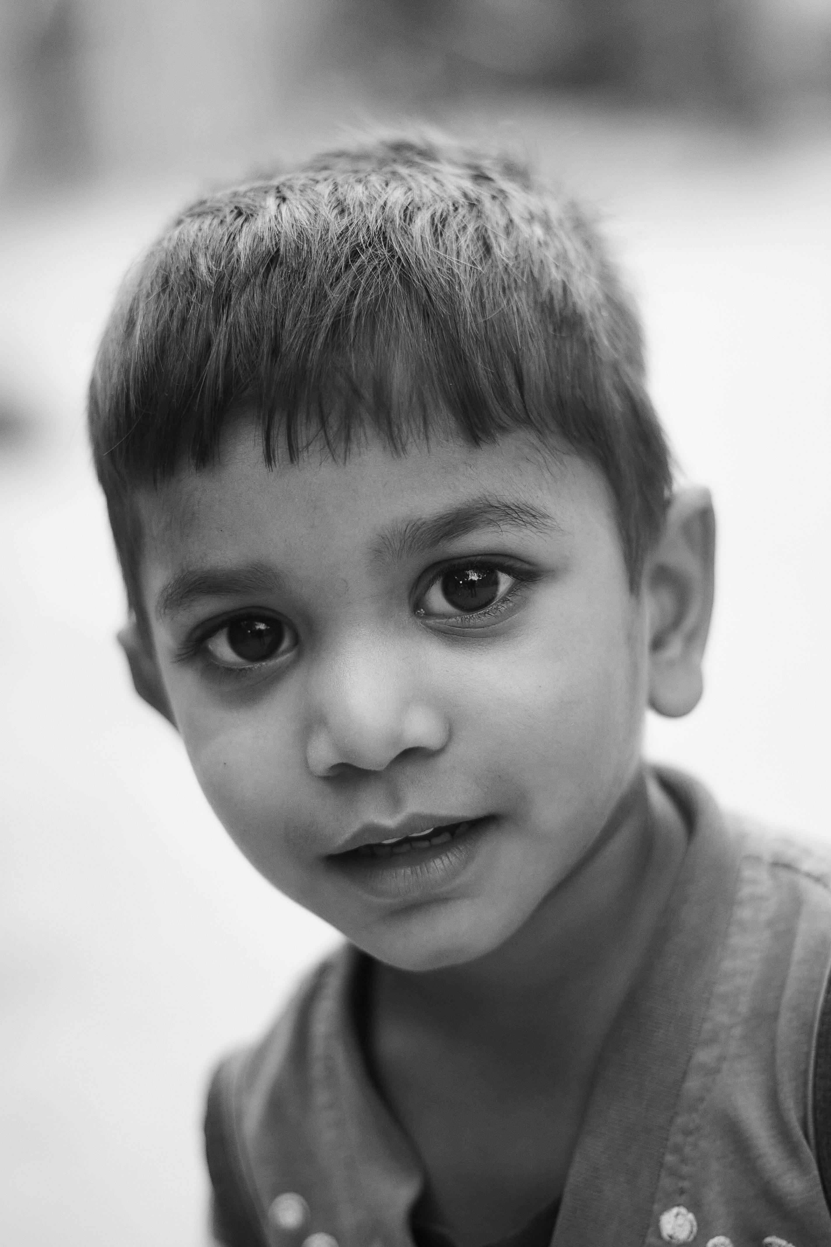 Grayscale Photo of a Boy's Face · Free Stock Photo