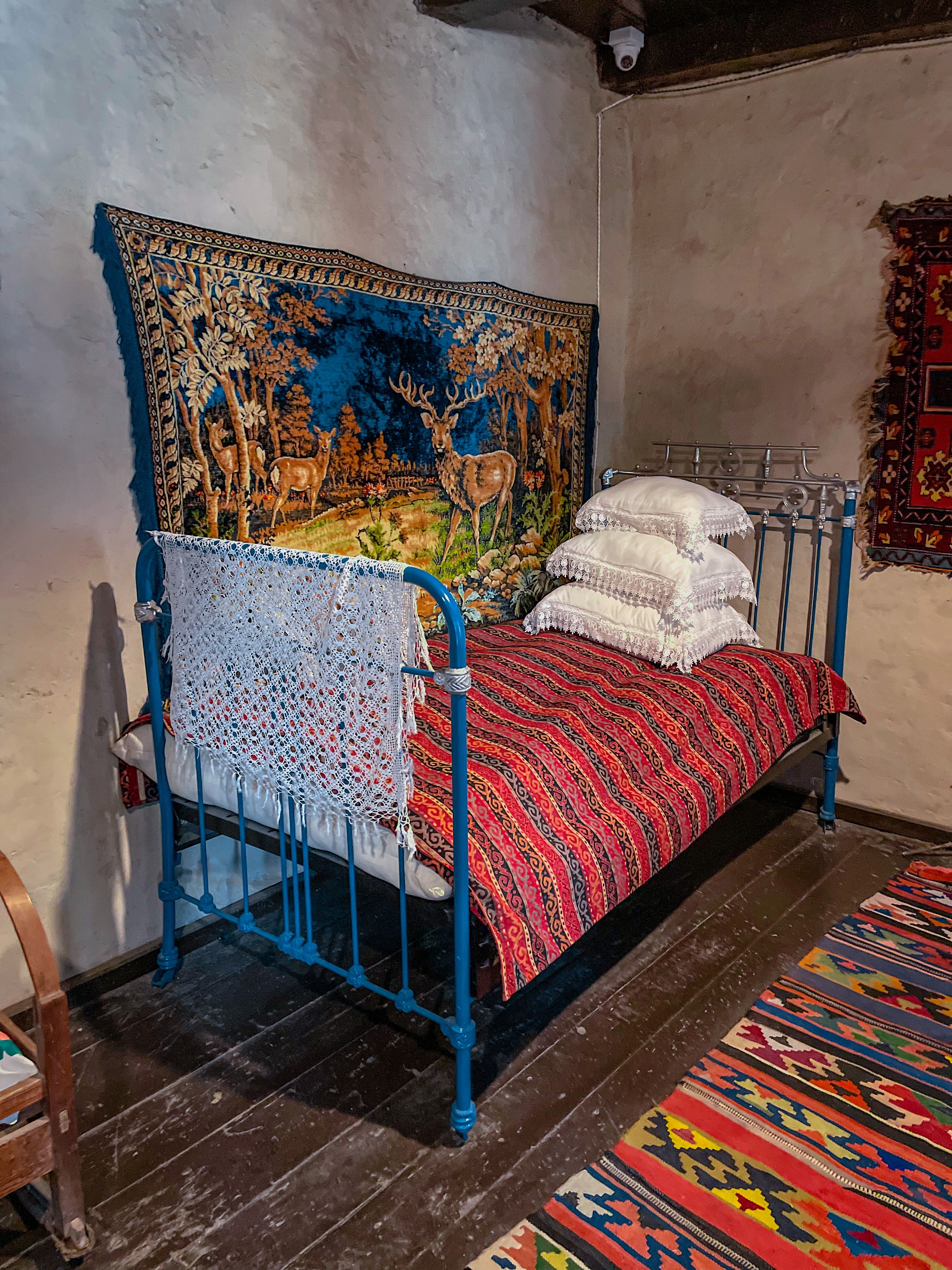 Museum Exhibition with a Traditional Folk Bed · Free Stock Photo