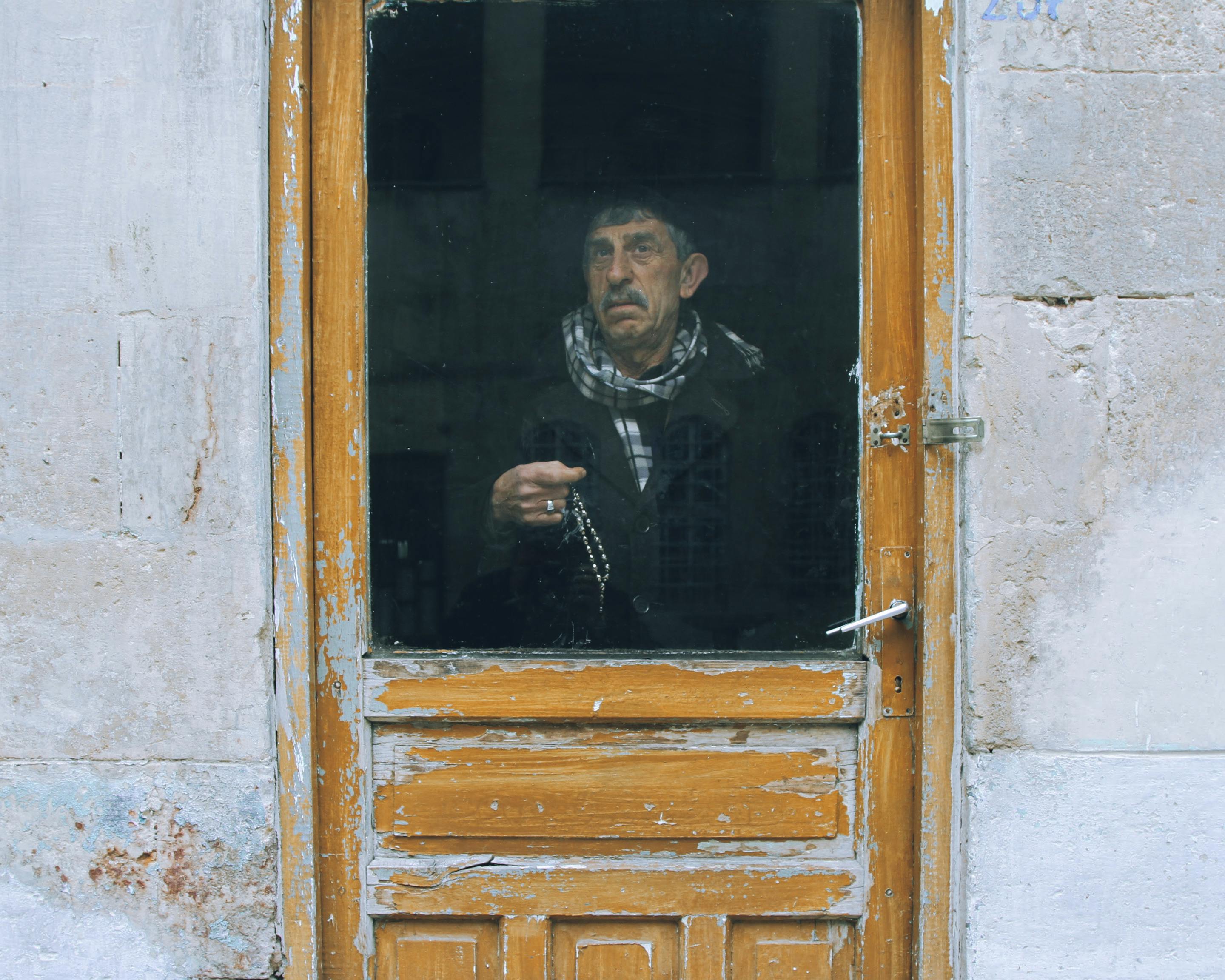 Man in Door Window · Free Stock Photo