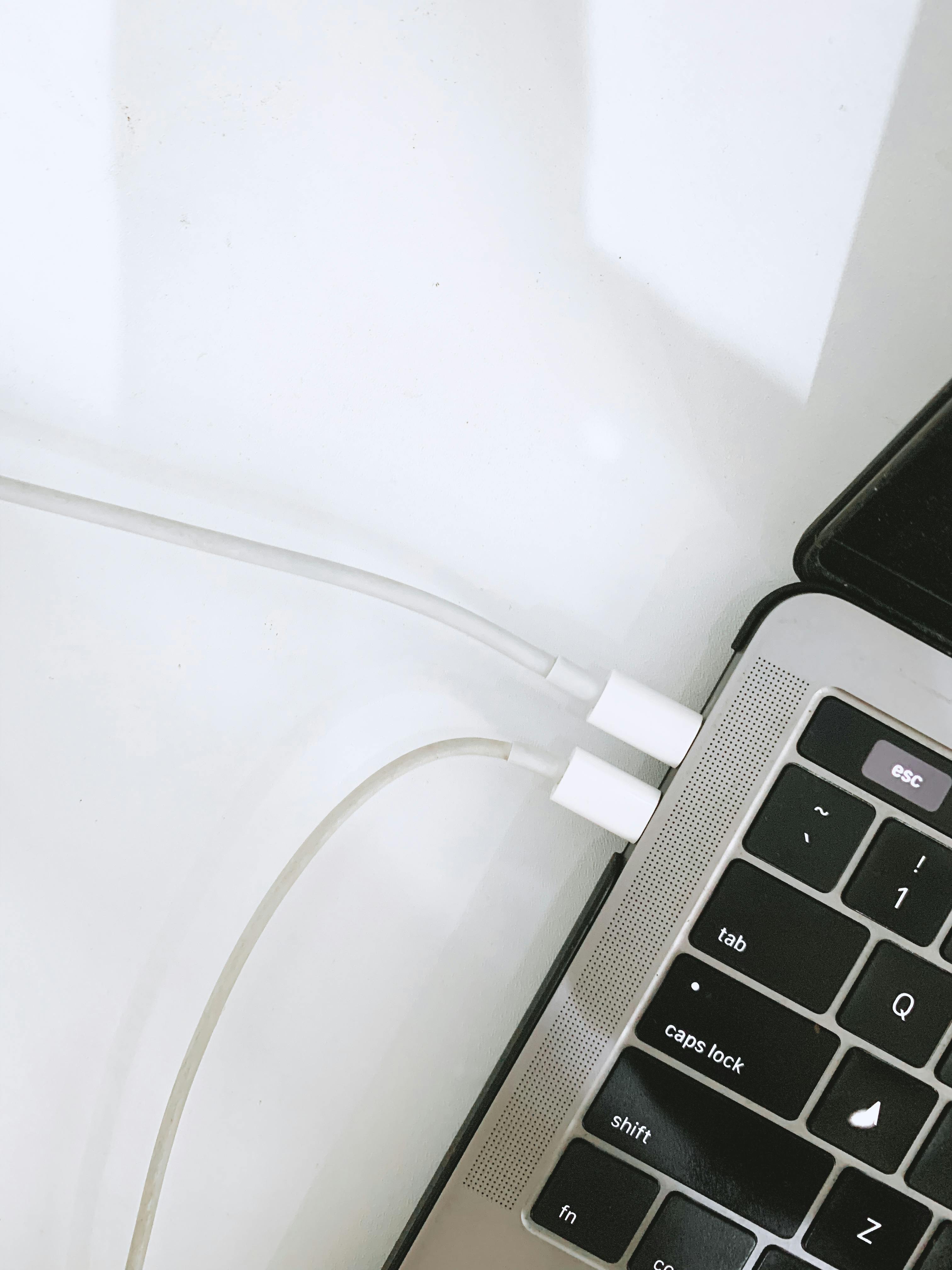 Wires Plugged in Laptop · Free Stock Photo