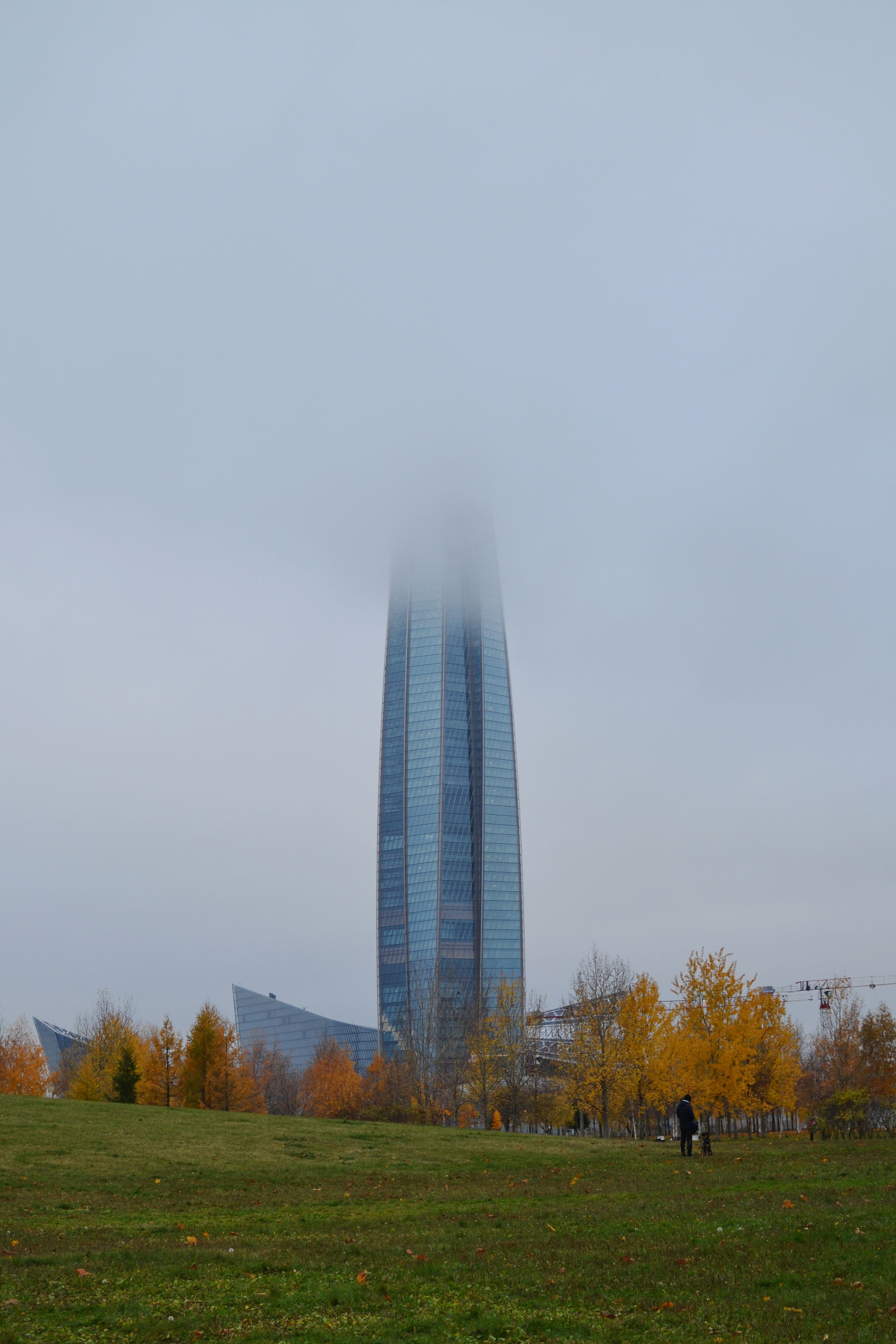 Modern High Rise Building on Grass Field · Free Stock Photo