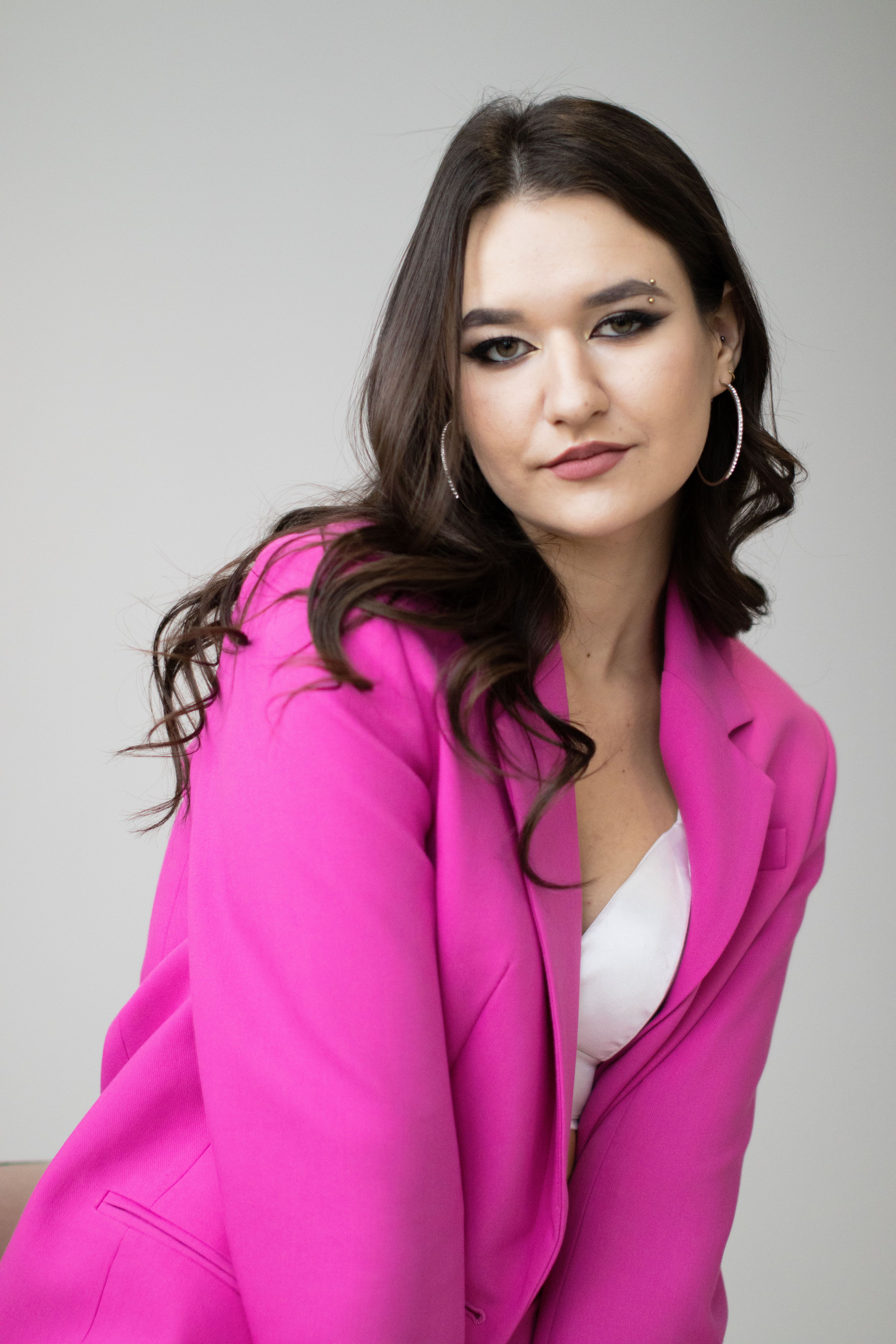 Close Up Photo of a Woman in Pink Blazer · Free Stock Photo