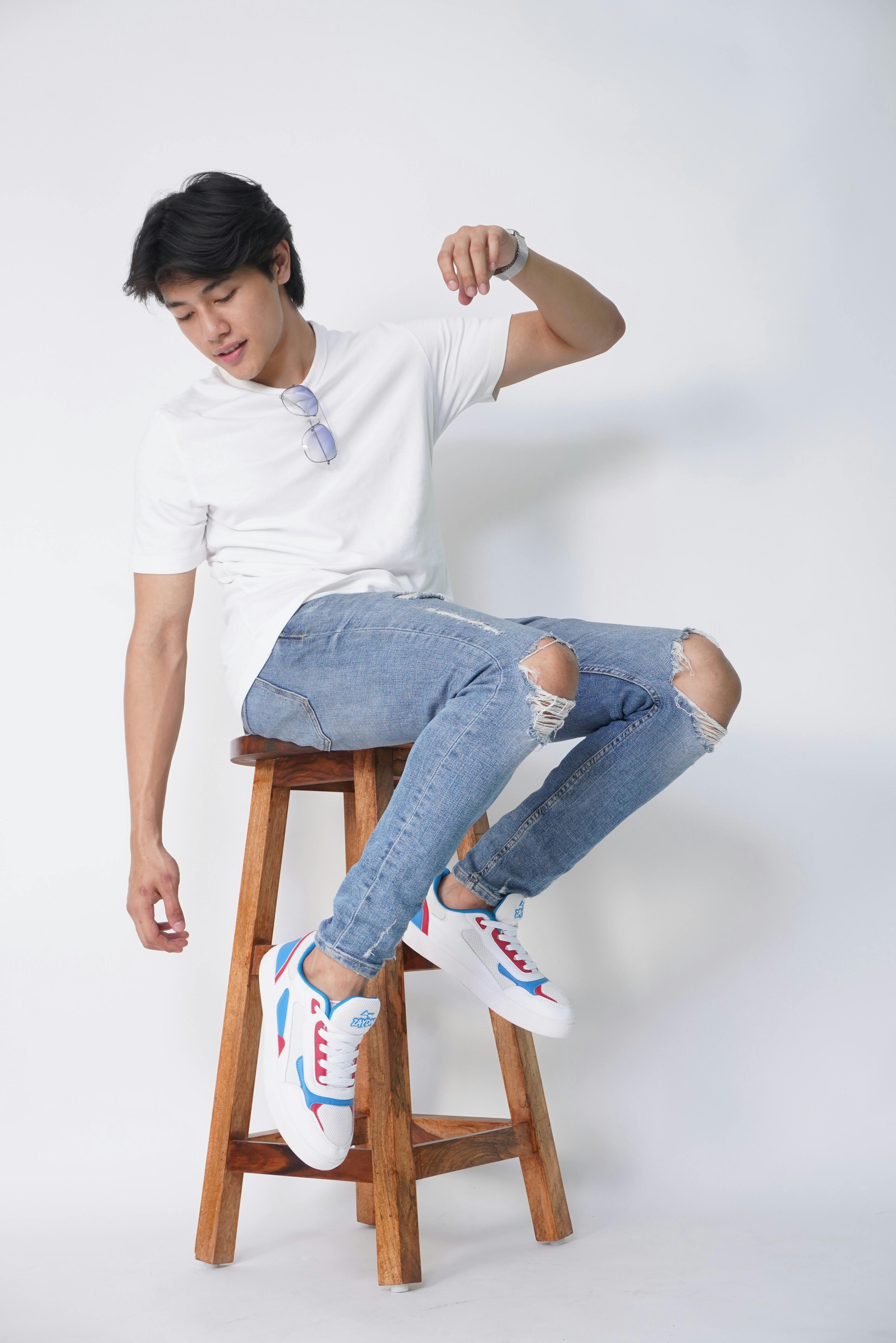 Man Falling out of Chair · Free Stock Photo