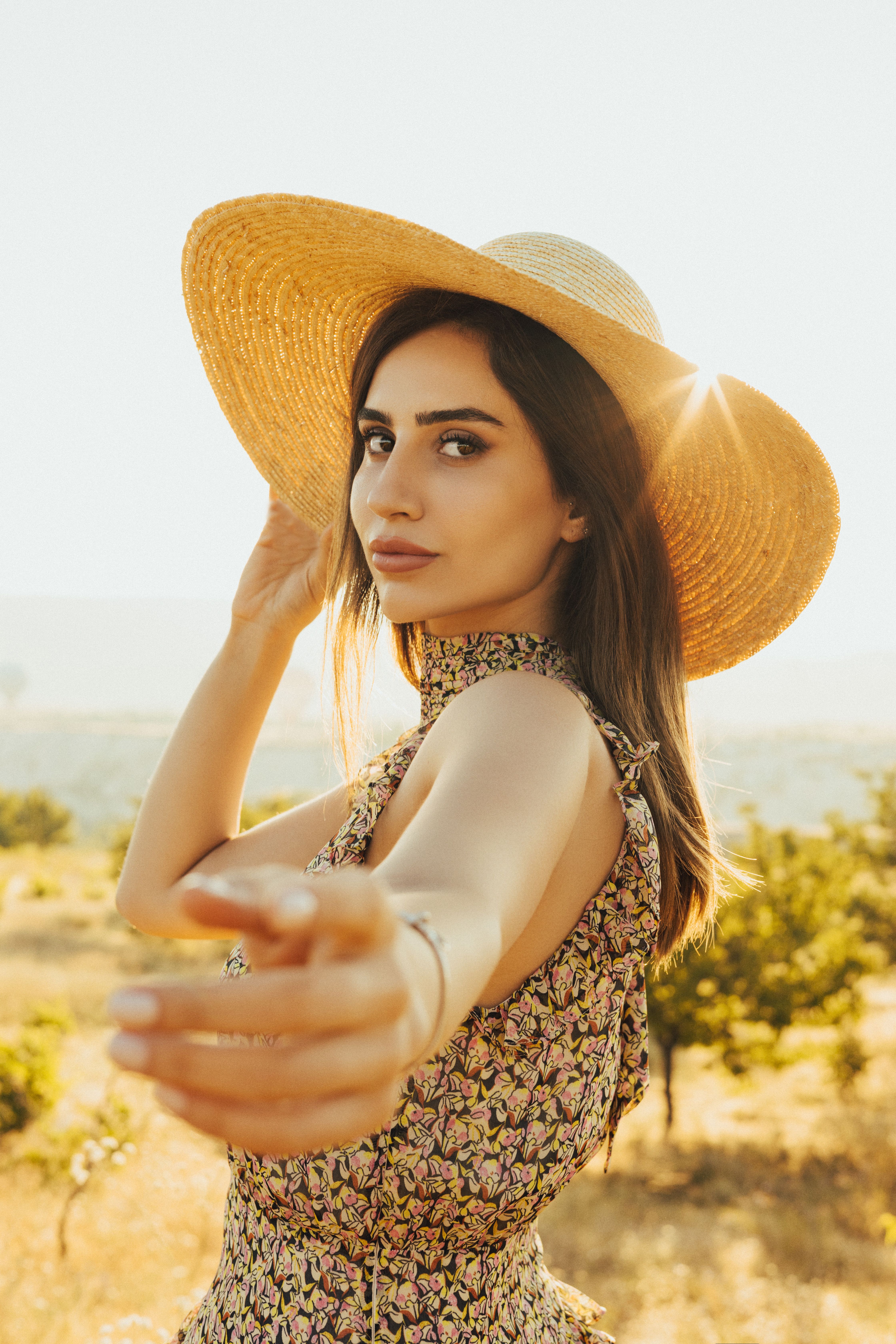 Photo of Woman Wearing Sun Hat · Free Stock Photo