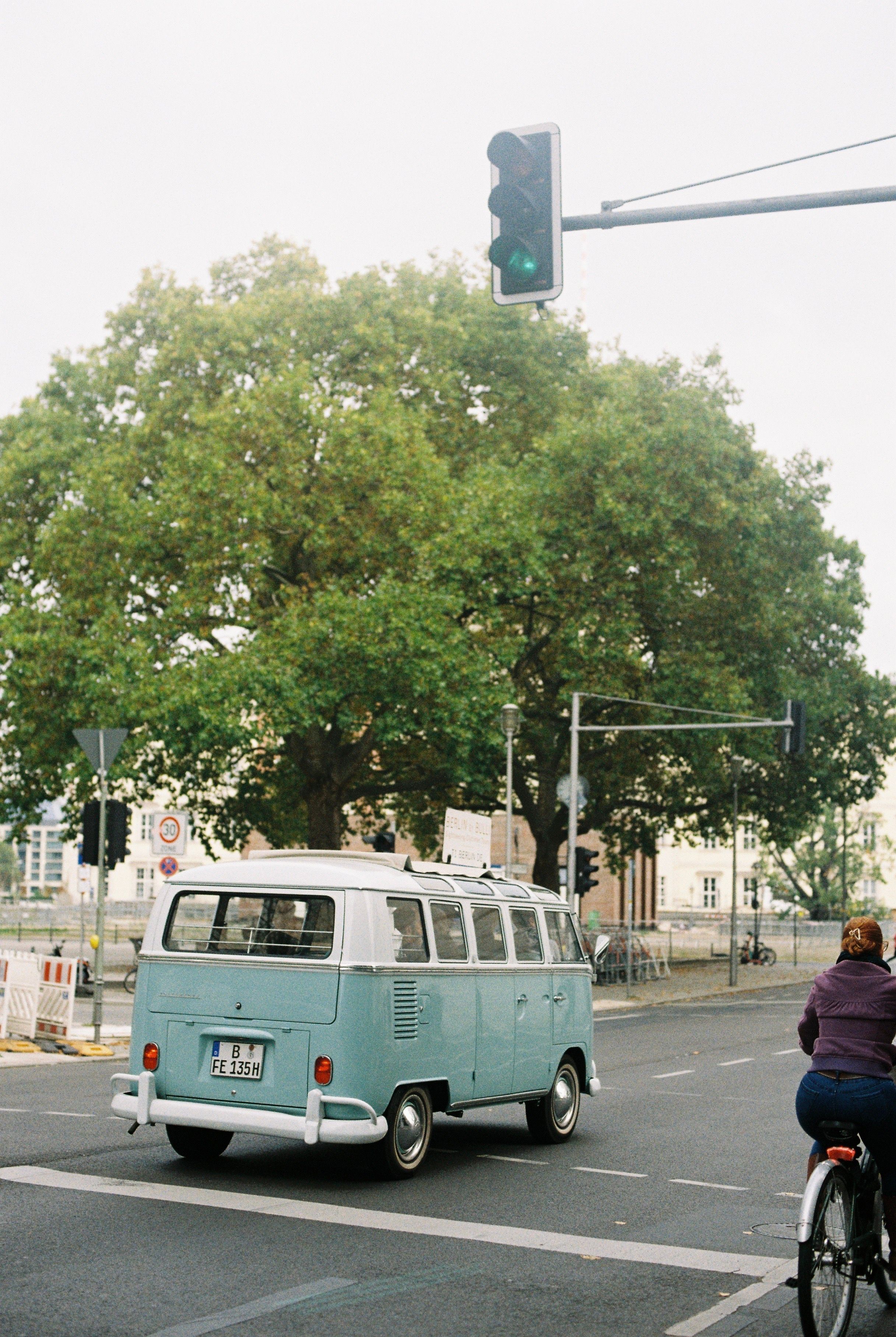 Vintage Volkswagen Van on the Road · Free Stock Photo