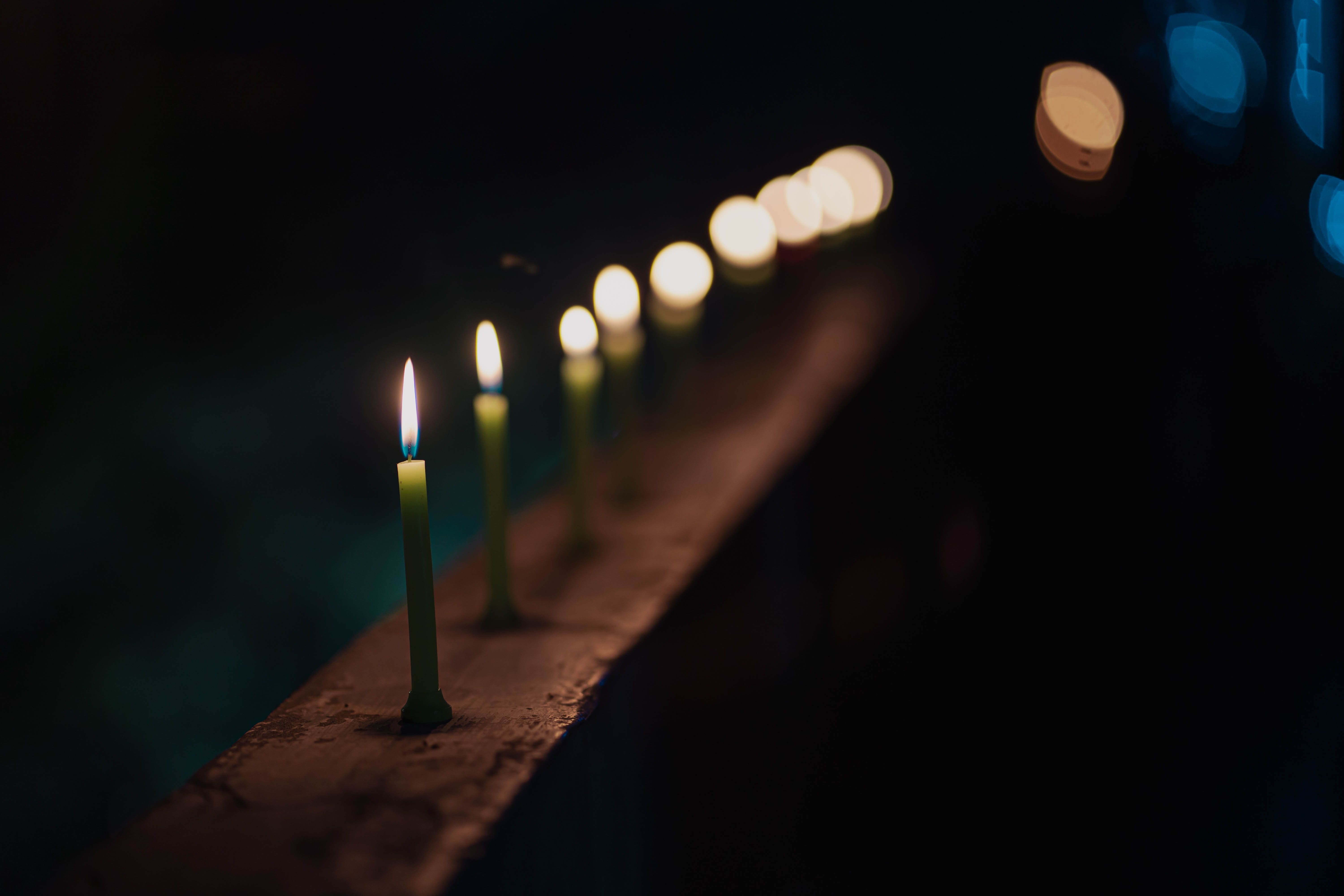 Wax Candles in Row at Night · Free Stock Photo