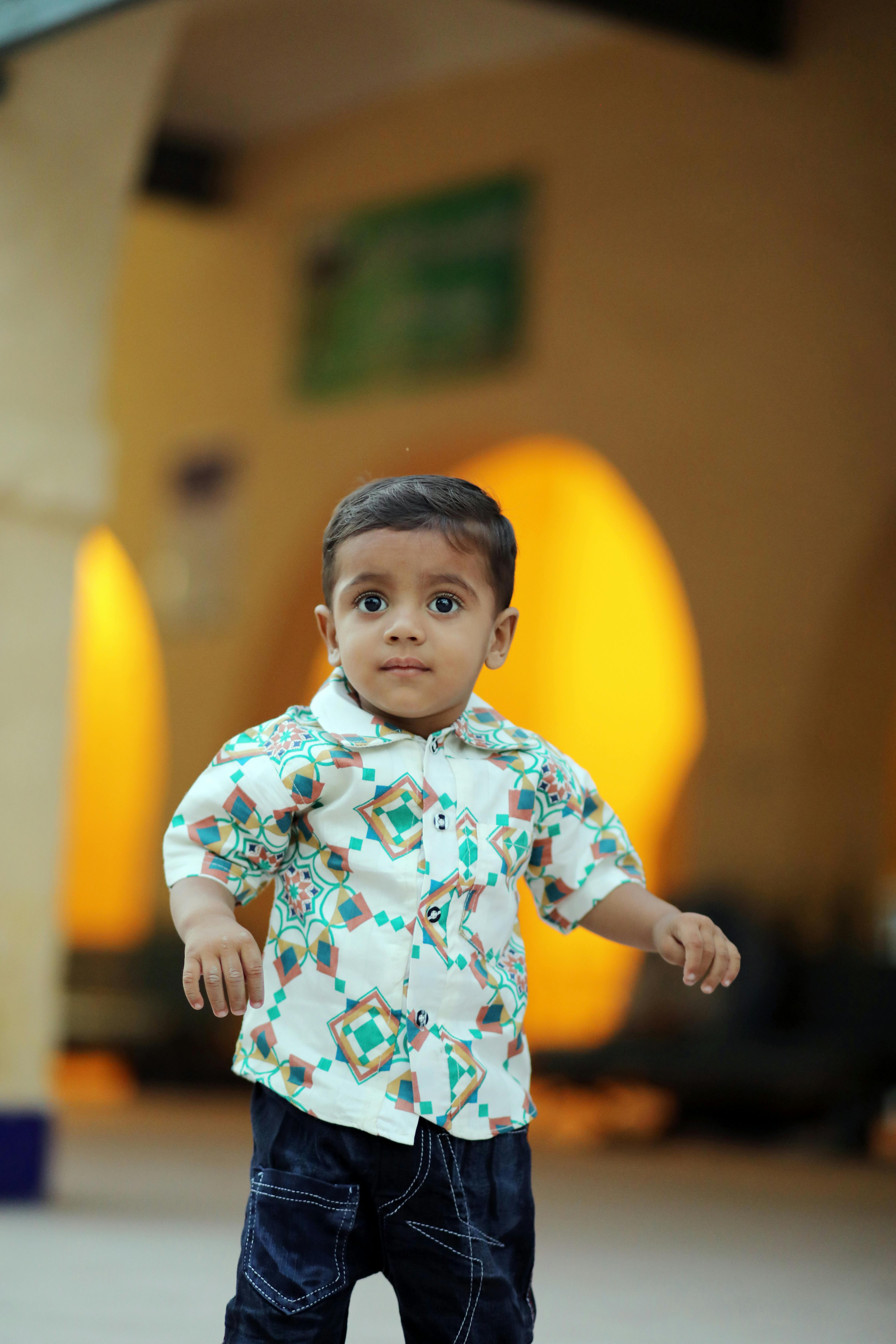 Photo of a Boy with a Flashlight · Free Stock Photo