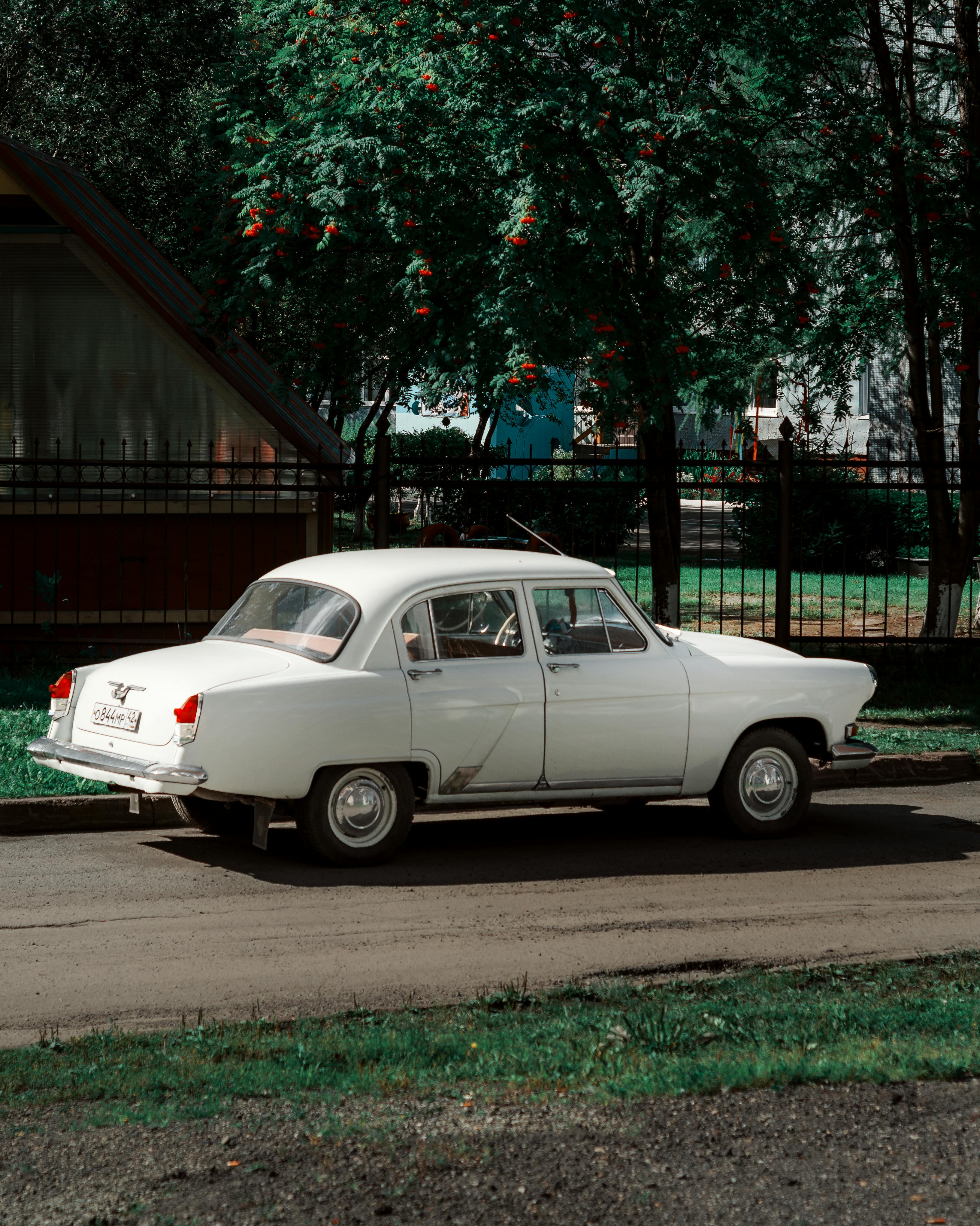Vintage Car Parked in Countryside · Free Stock Photo