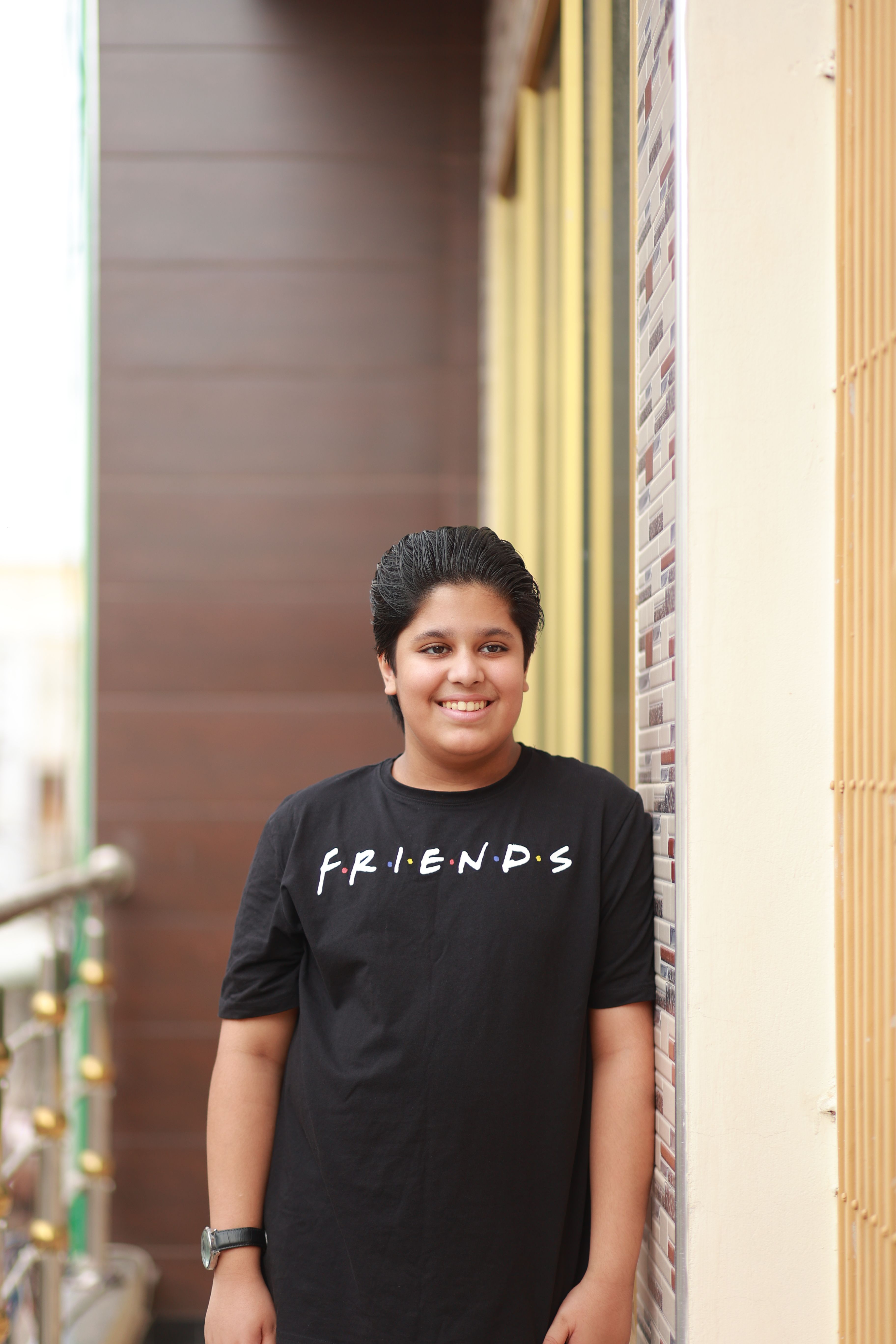 Young Boy in a Black T-shirt Smiling · Free Stock Photo