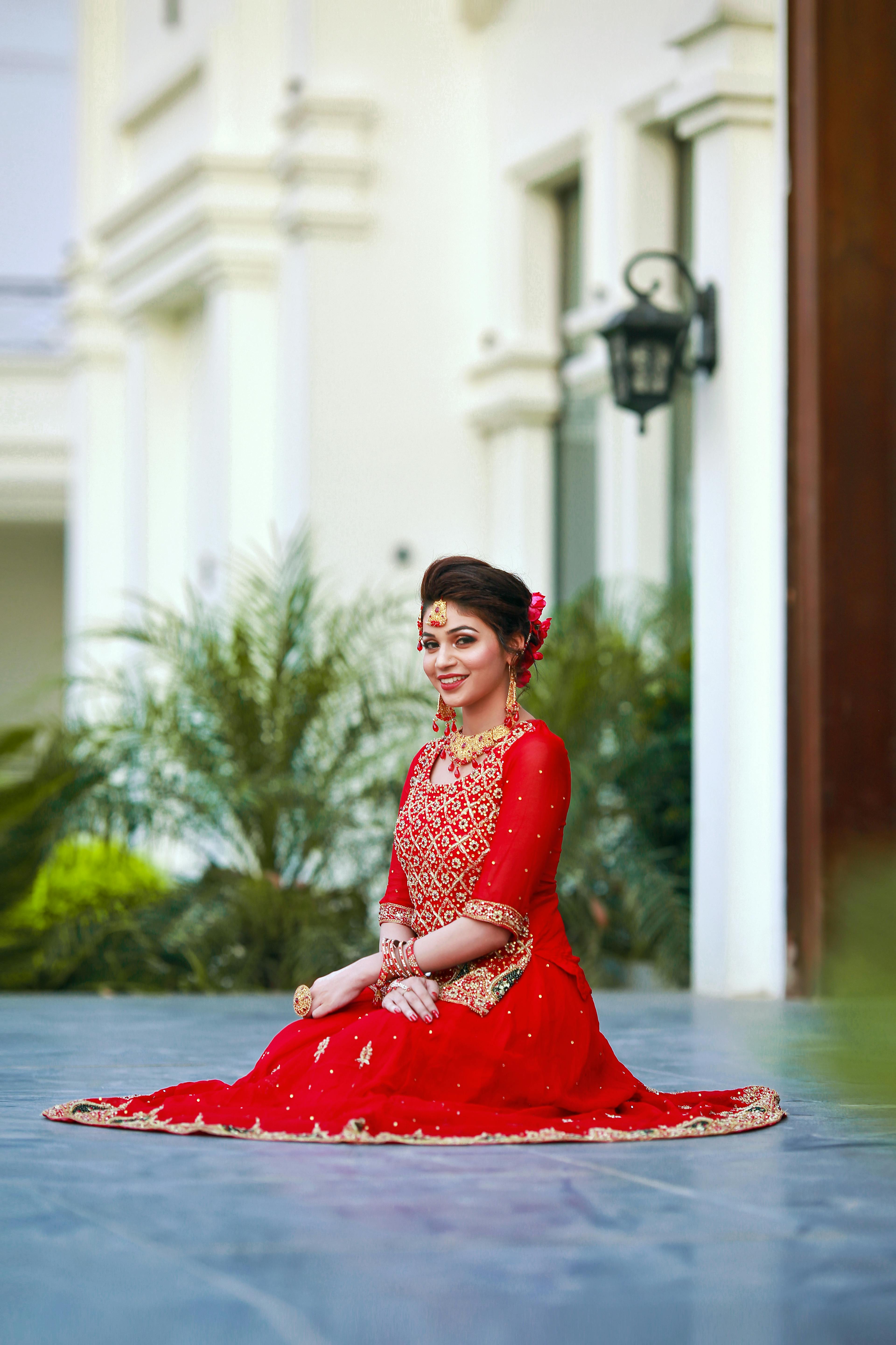 Portrait of Pretty Woman in Red Traditional Clothes · Free Stock Photo
