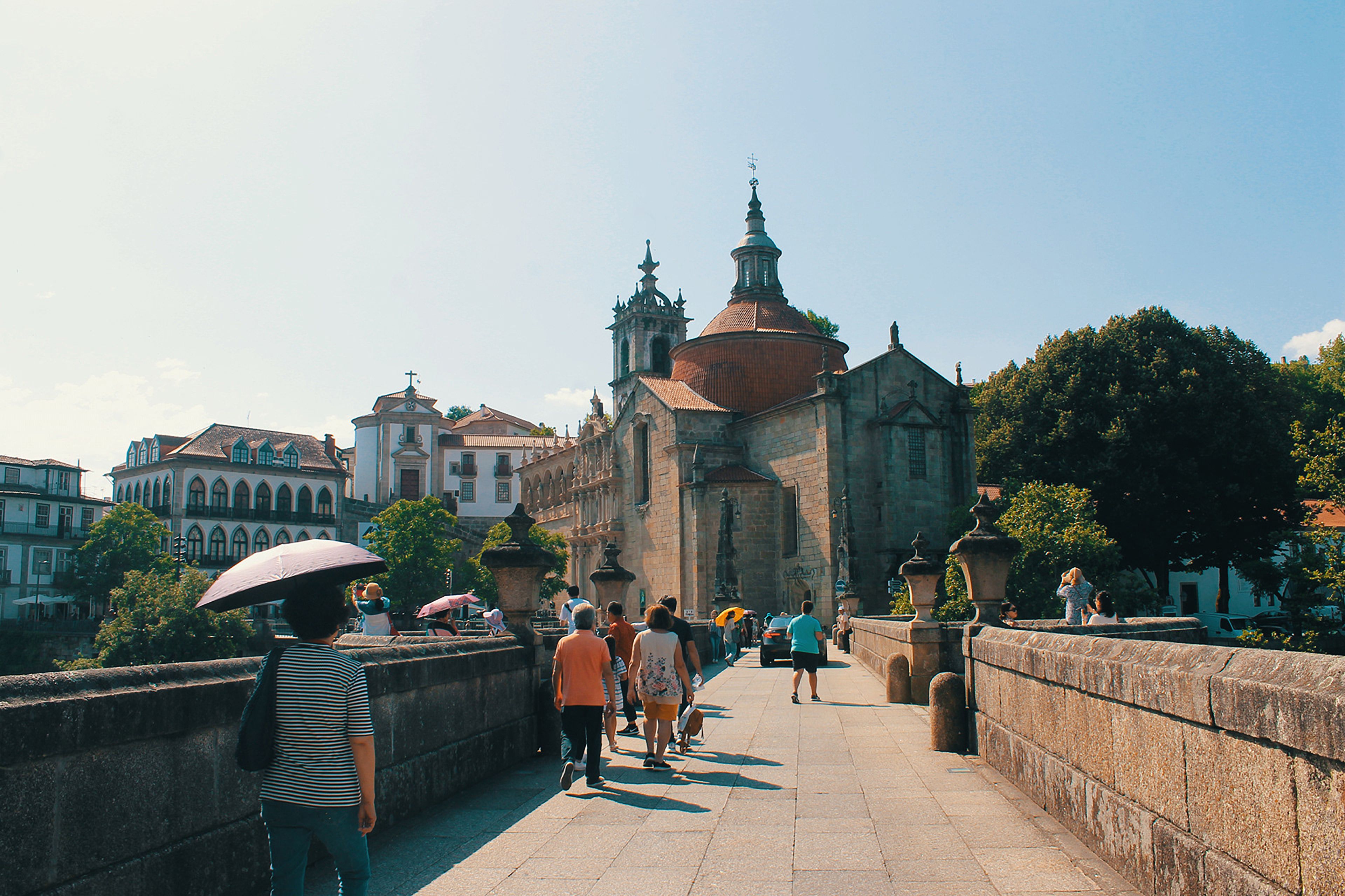 People Walking Towards a Cathedral · Free Stock Photo