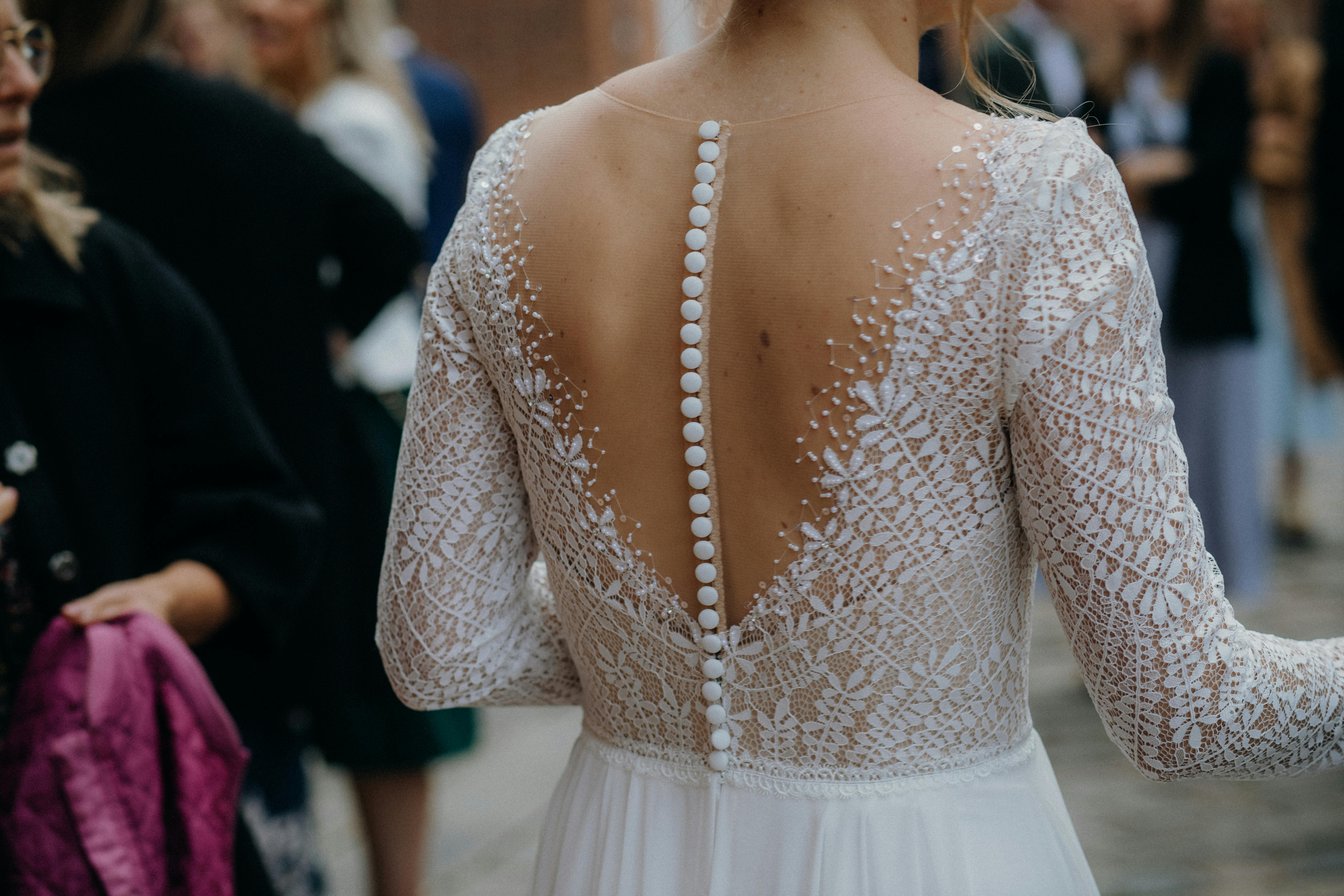 Back View of a Woman in White Wedding Dress · Free Stock Photo