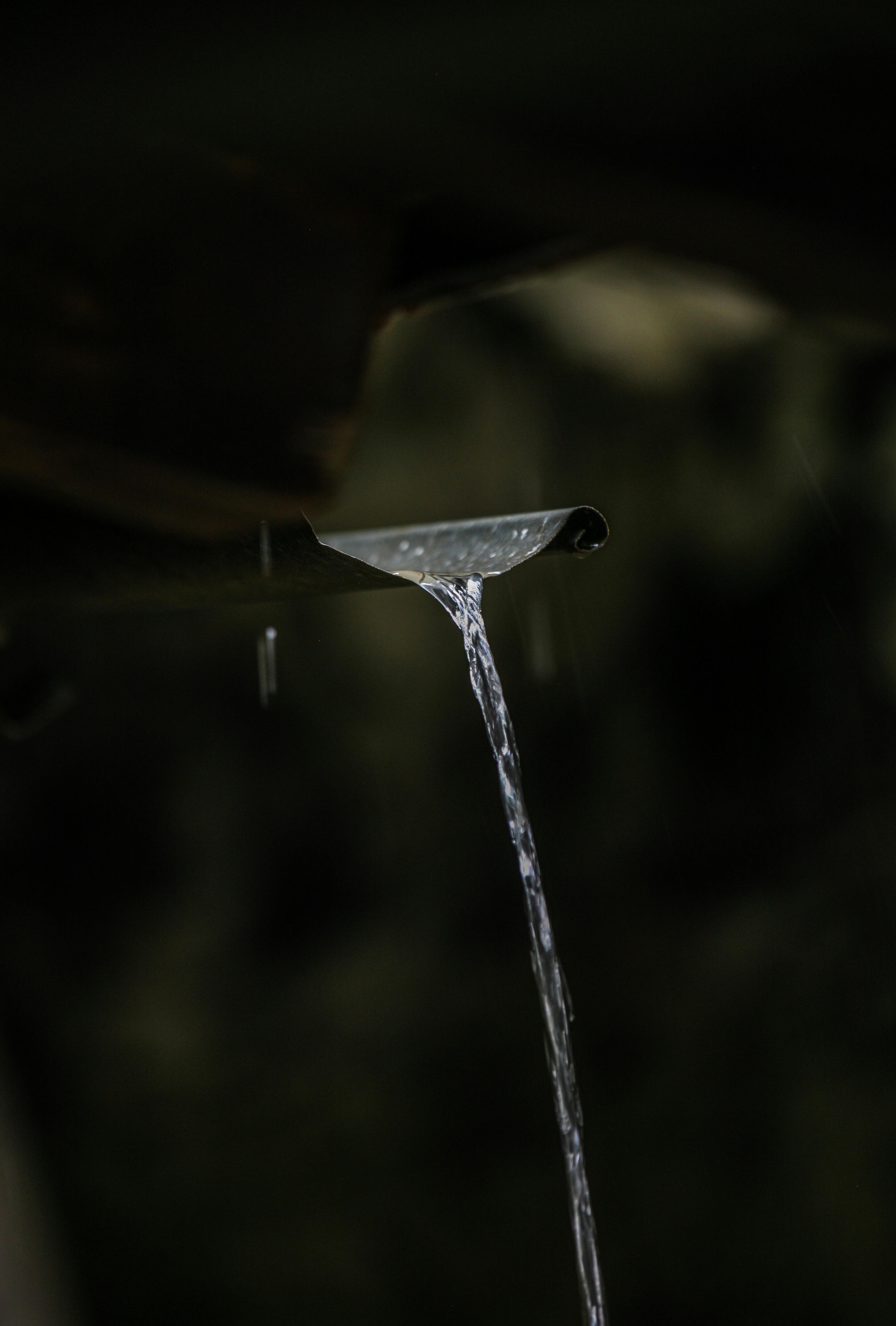 Water Pouring on Pipe · Free Stock Photo