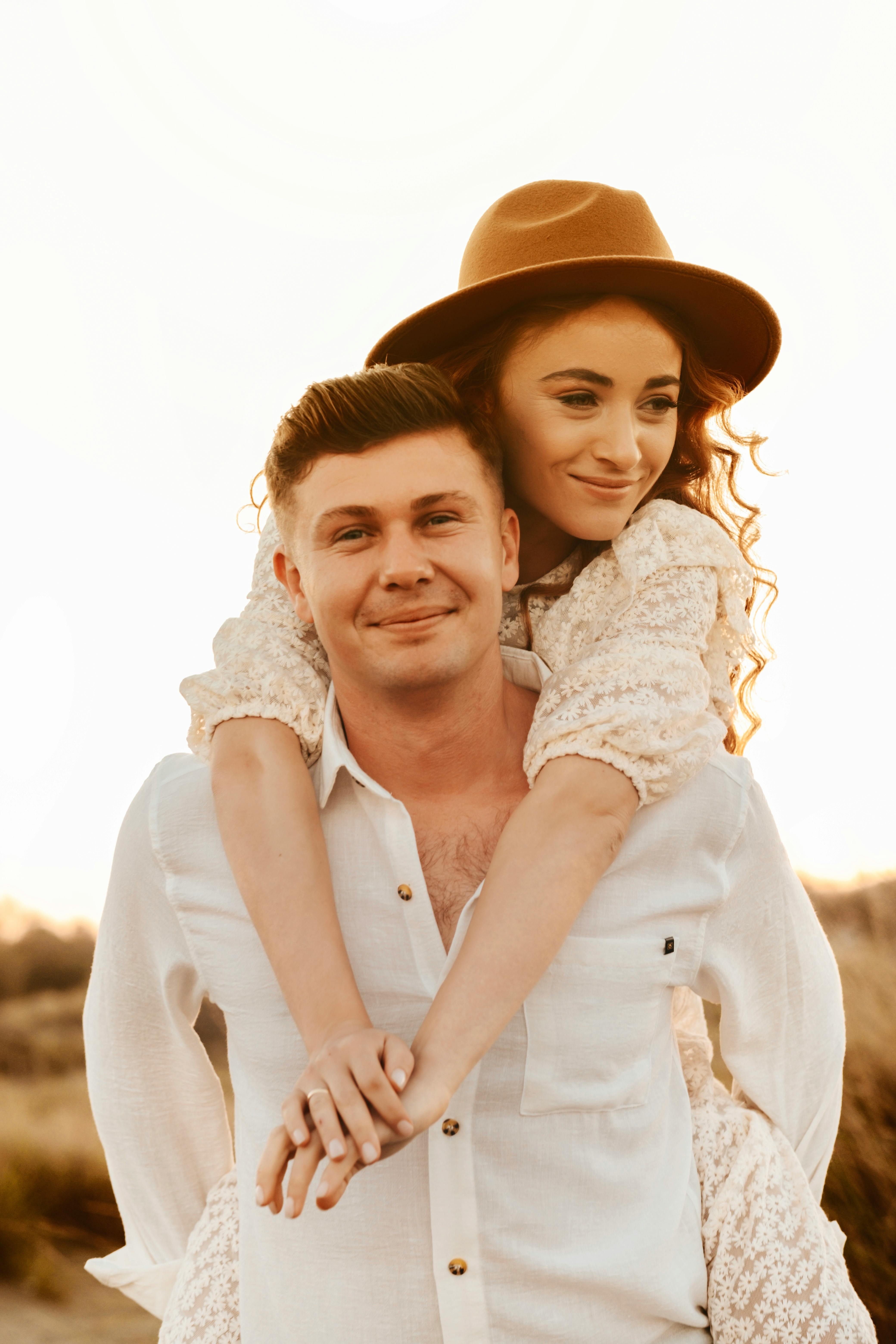 Man Carrying Piggyback Woman · Free Stock Photo