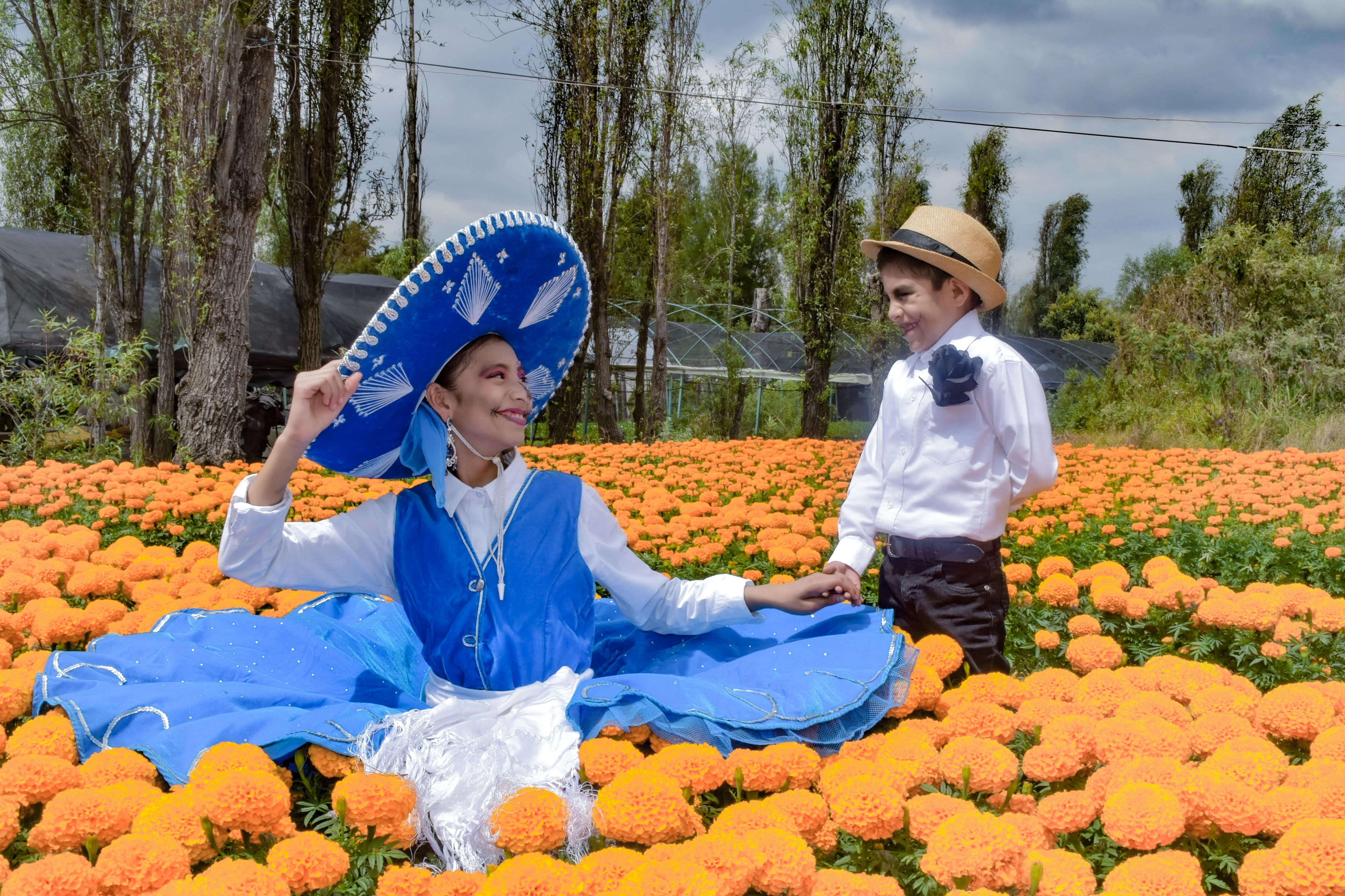 Mother and Son in Traditional Clothing for Dia de Muertos · Free Stock ...