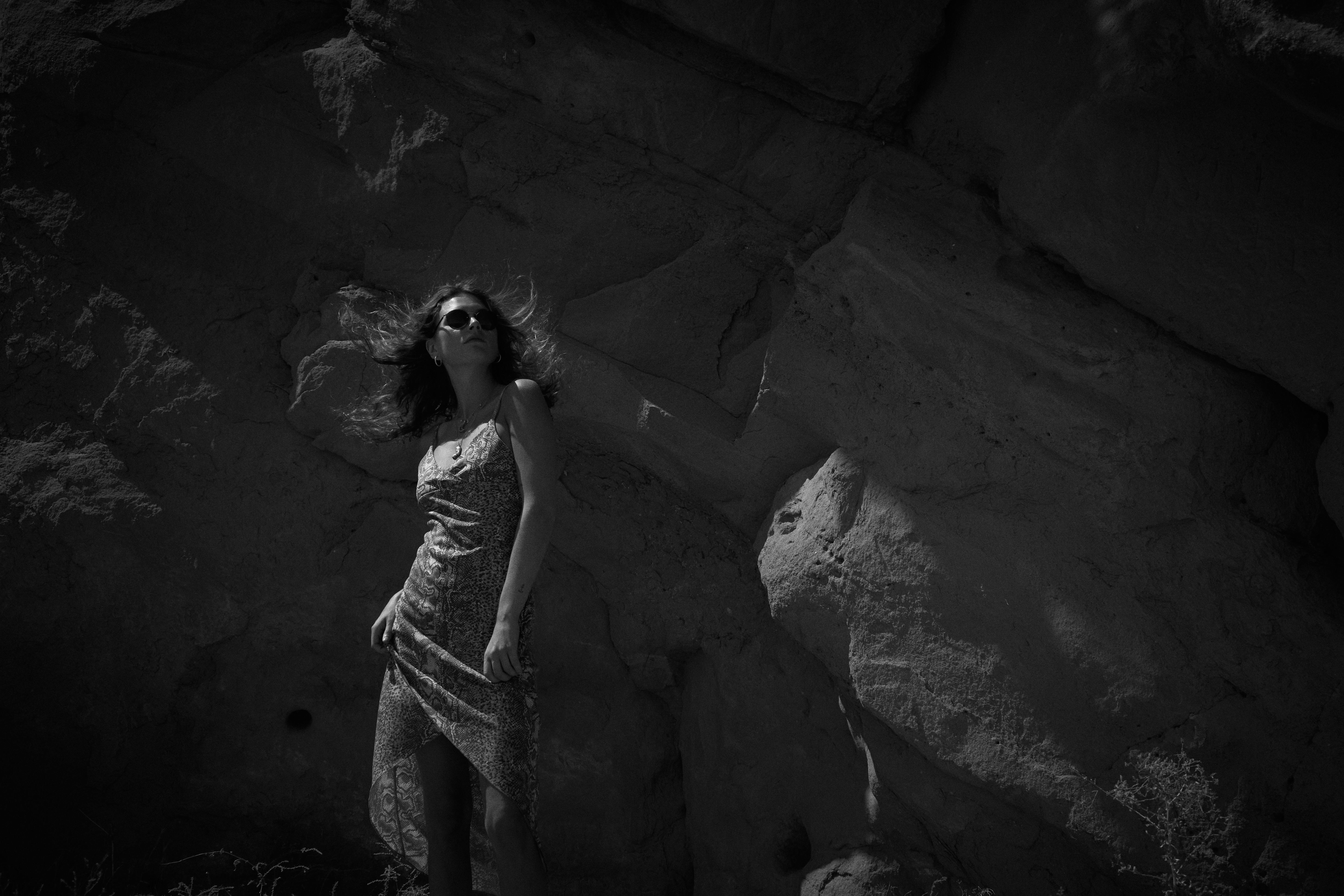 Brunette Woman in Dress Posing in Cave · Free Stock Photo