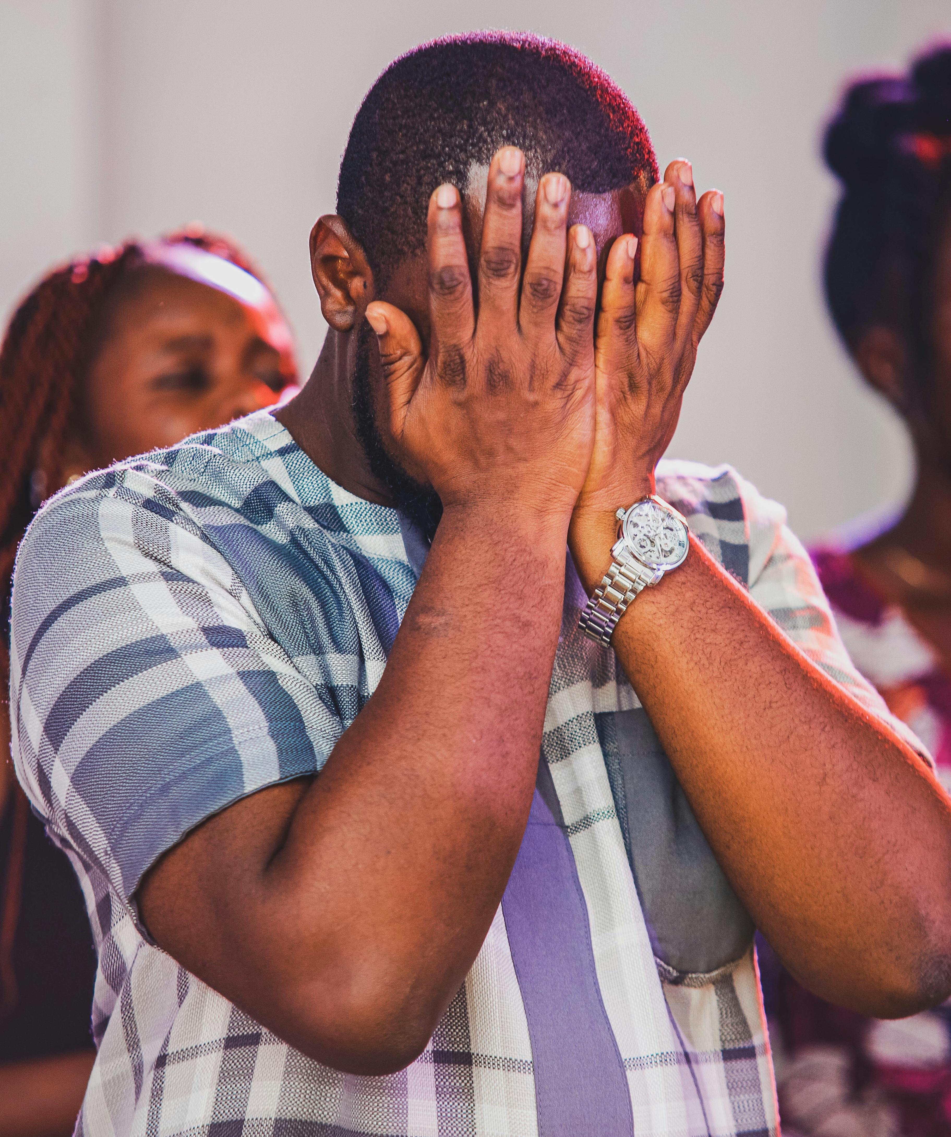 Man Standing with Arms Open Looking up Towards sky · Free Stock Photo