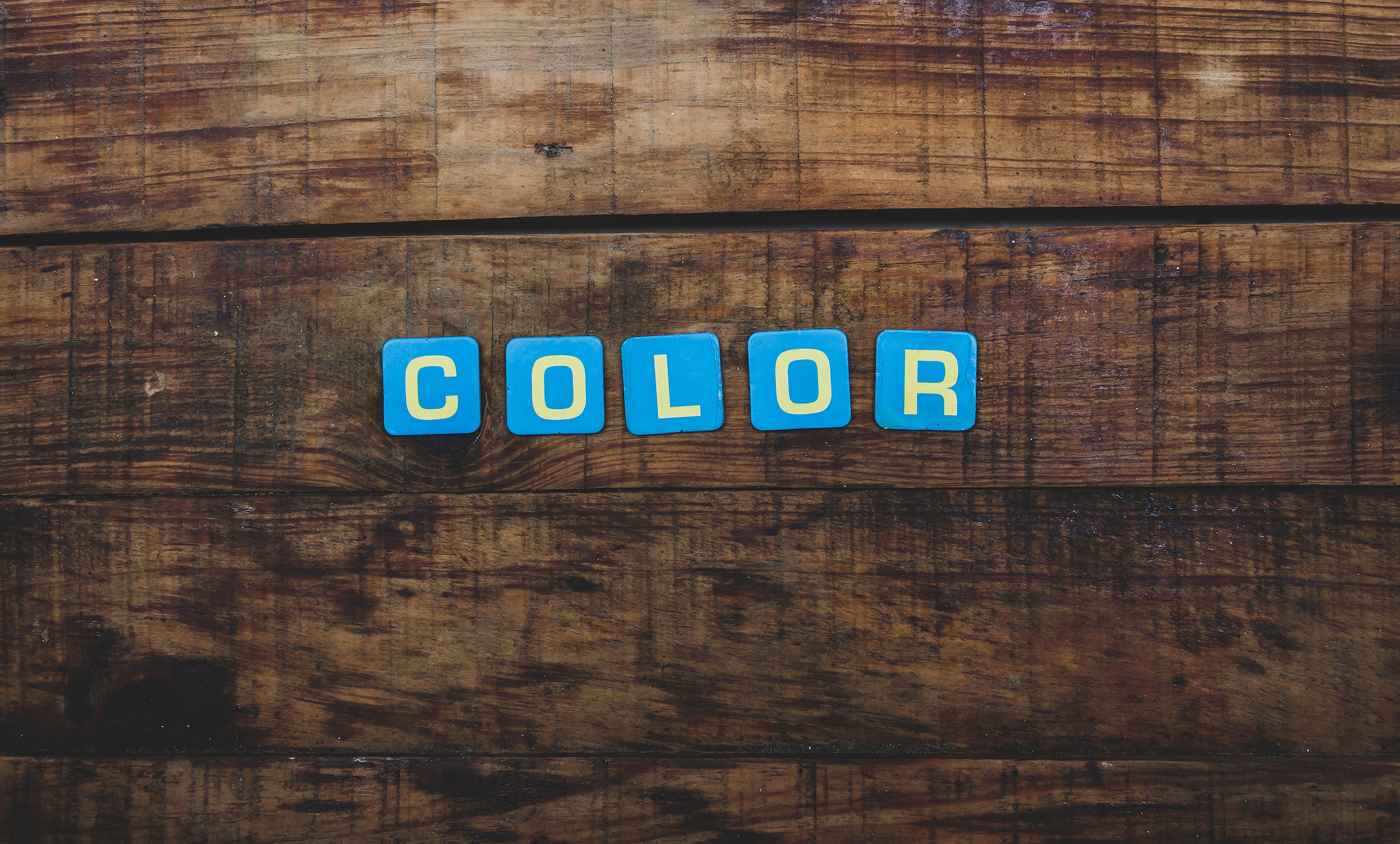 Blue Letter Blocks on Wooden Table · Free Stock Photo