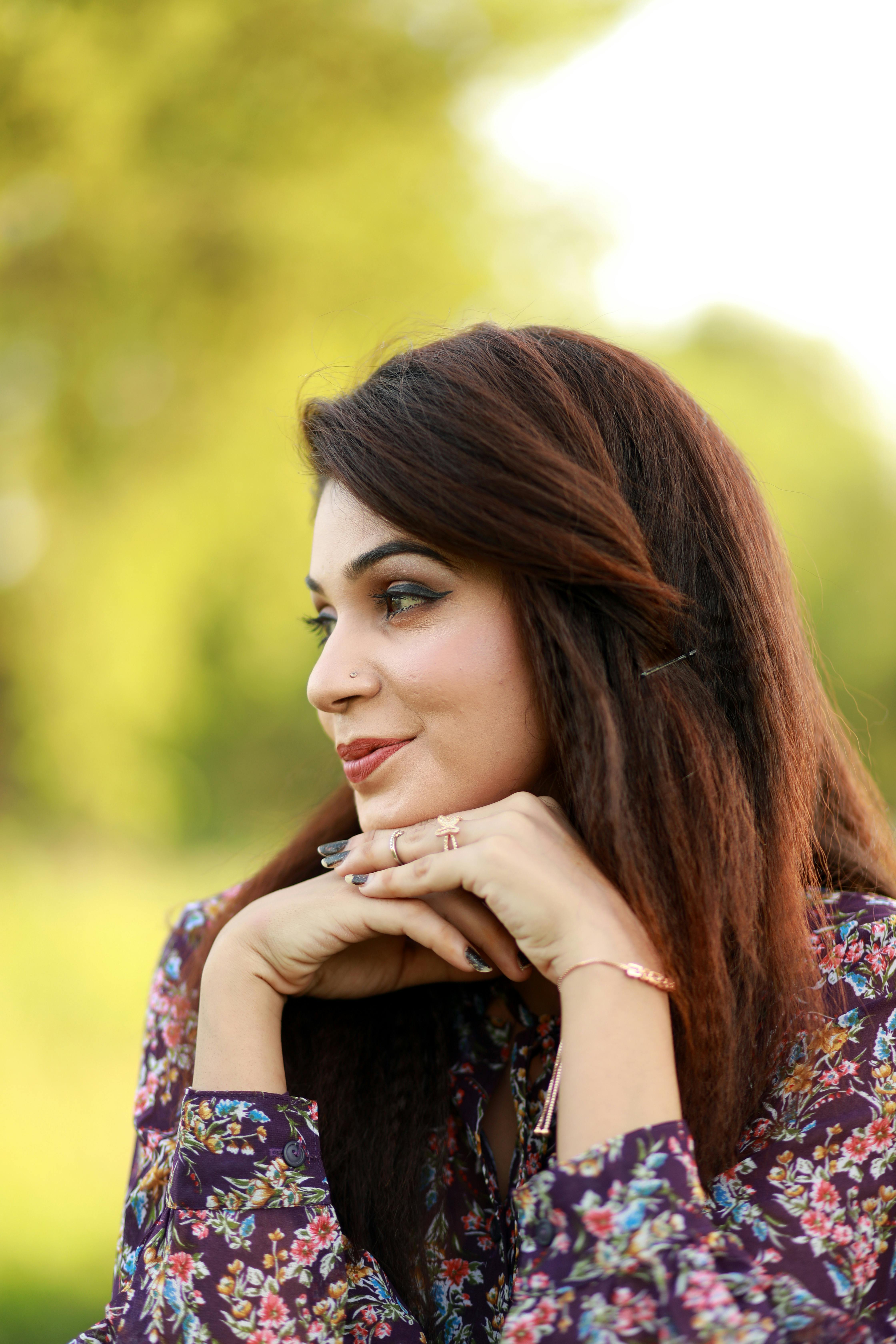 Woman Resting Her Head On Her Left Hand · Free Stock Photo