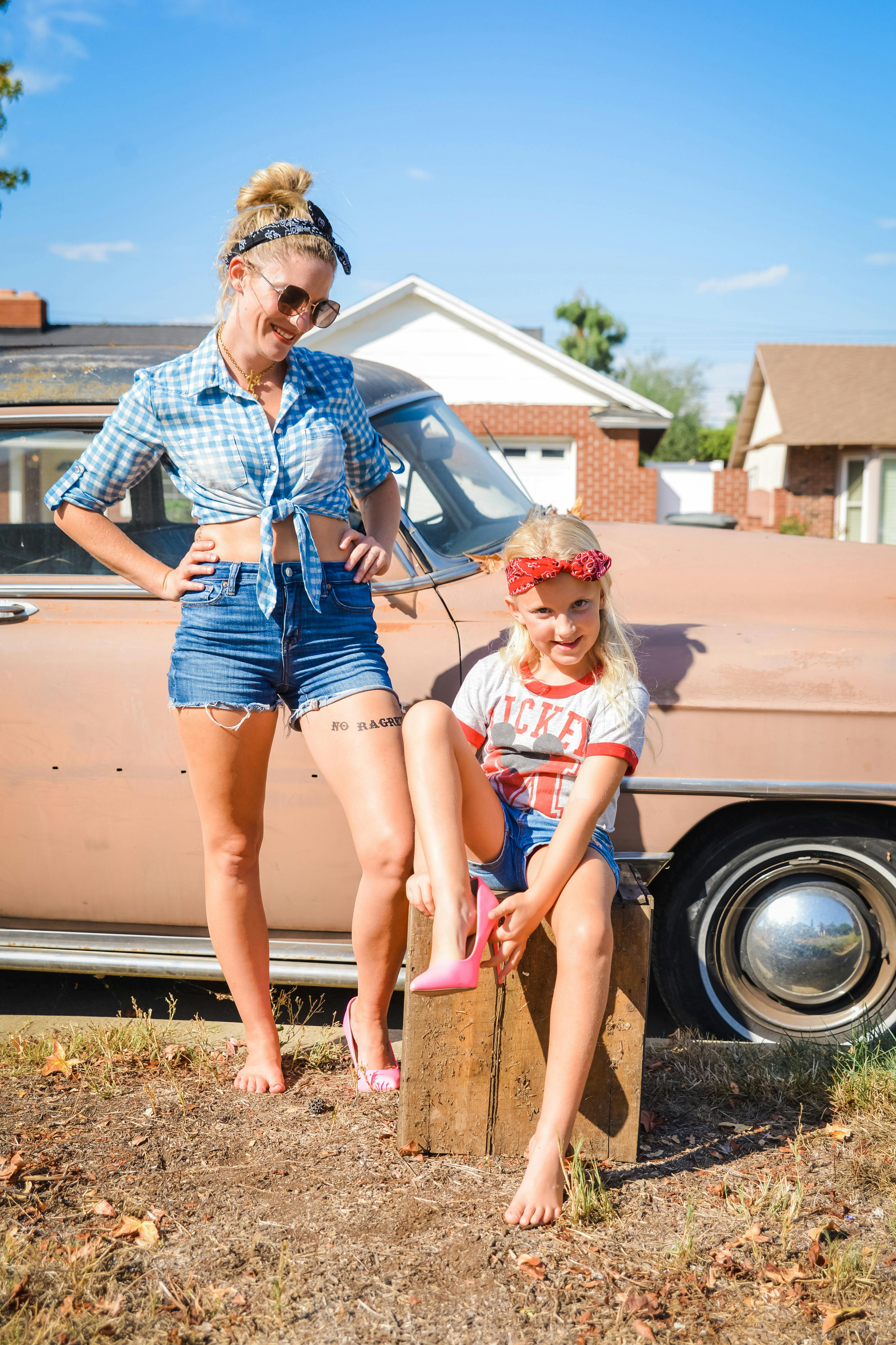 Little Girl Trying out Moms High Heels · Free Stock Photo