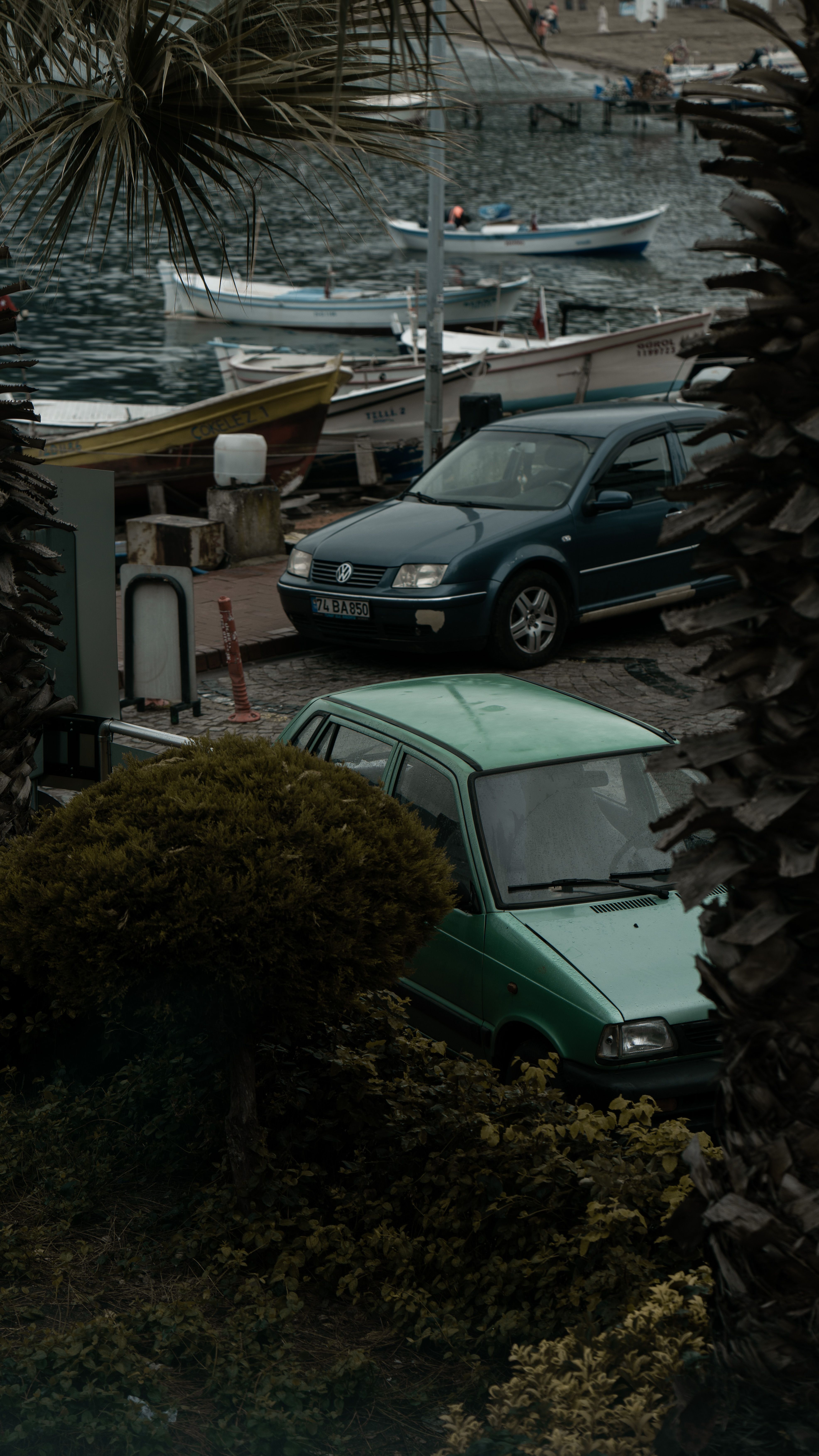 Cars Parked Beside a Dock · Free Stock Photo