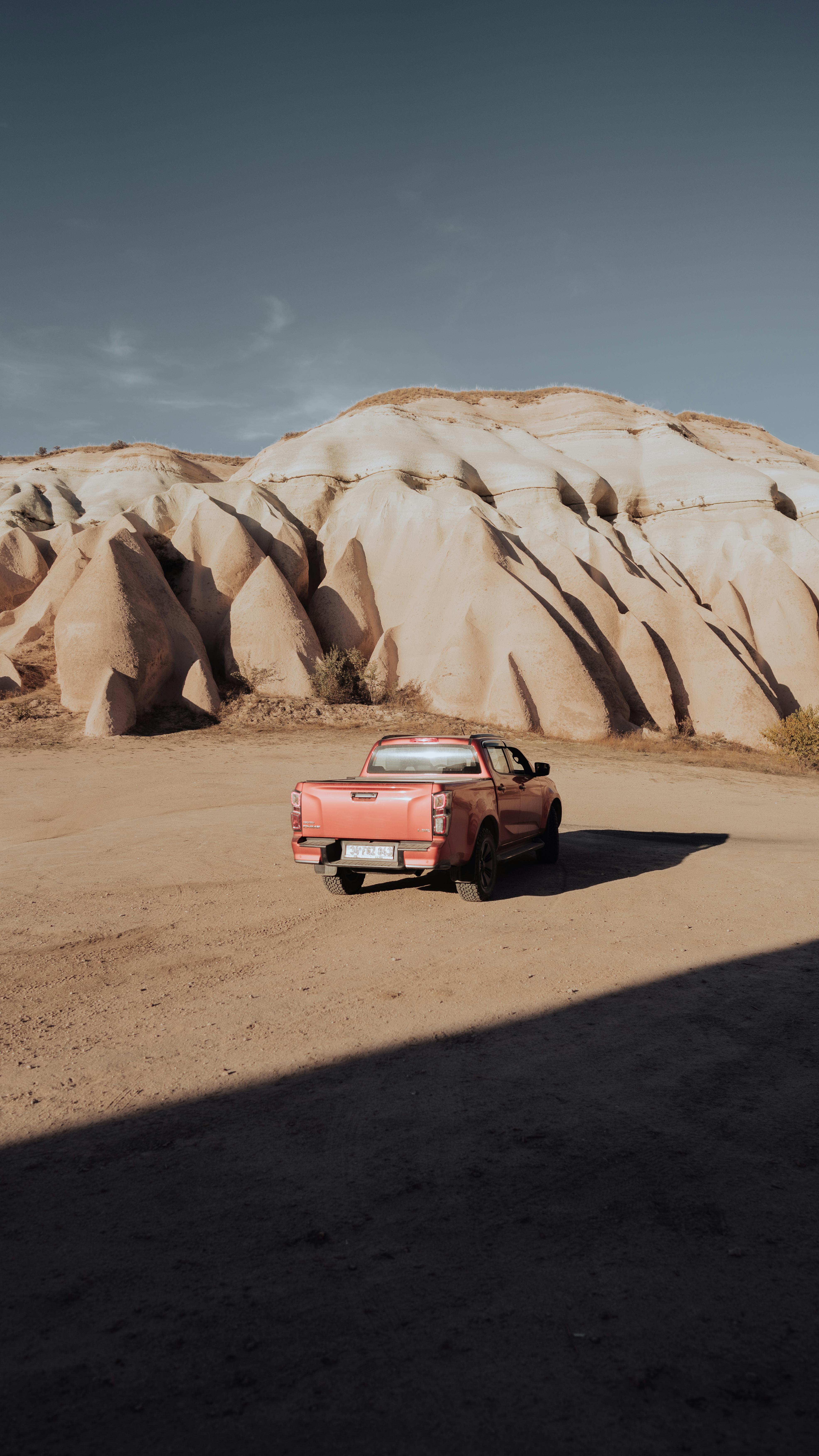 Red Pickup Truck on the Desert · Free Stock Photo