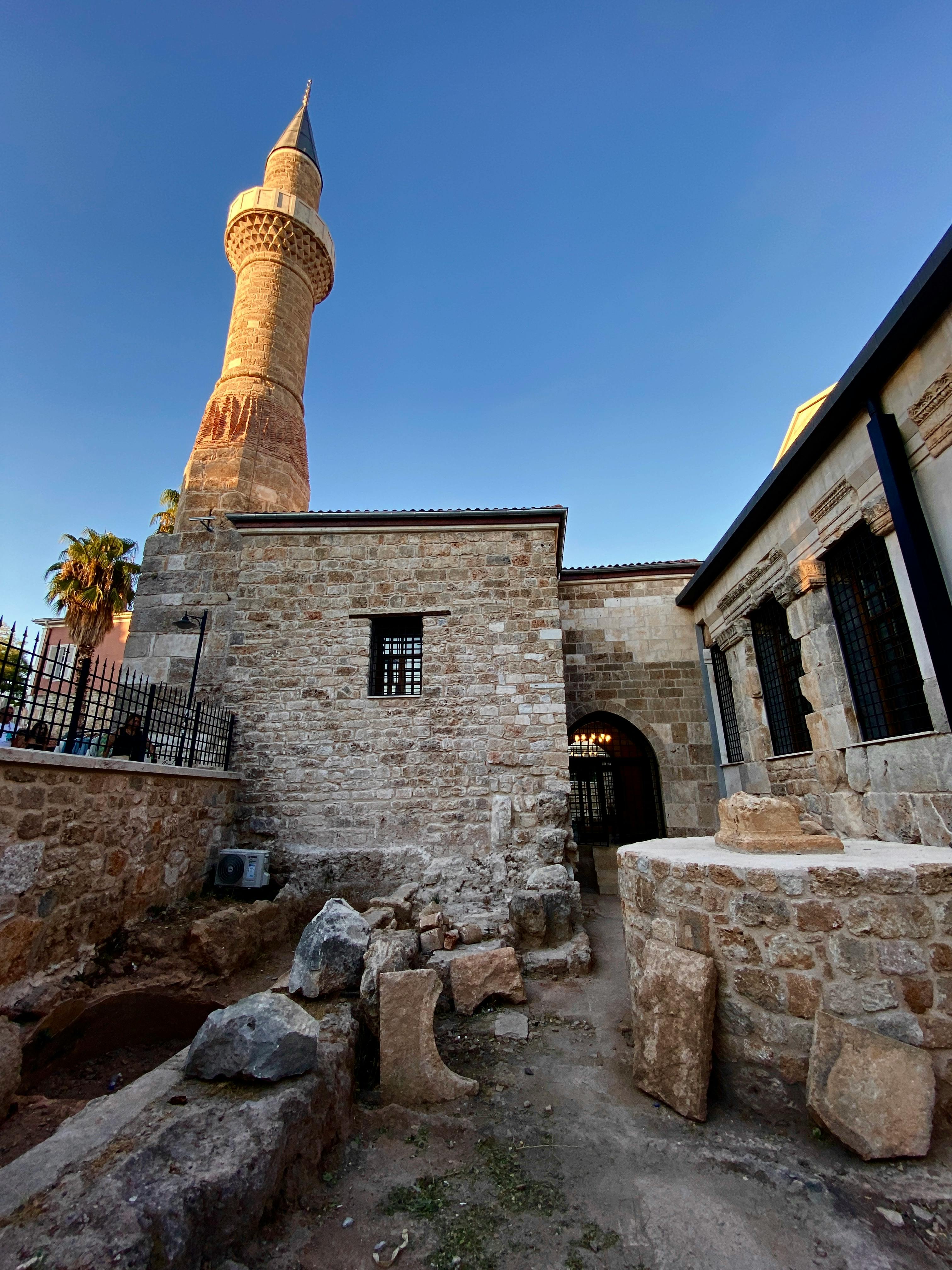 People Walking Outside Traditional Mosque · Free Stock Photo