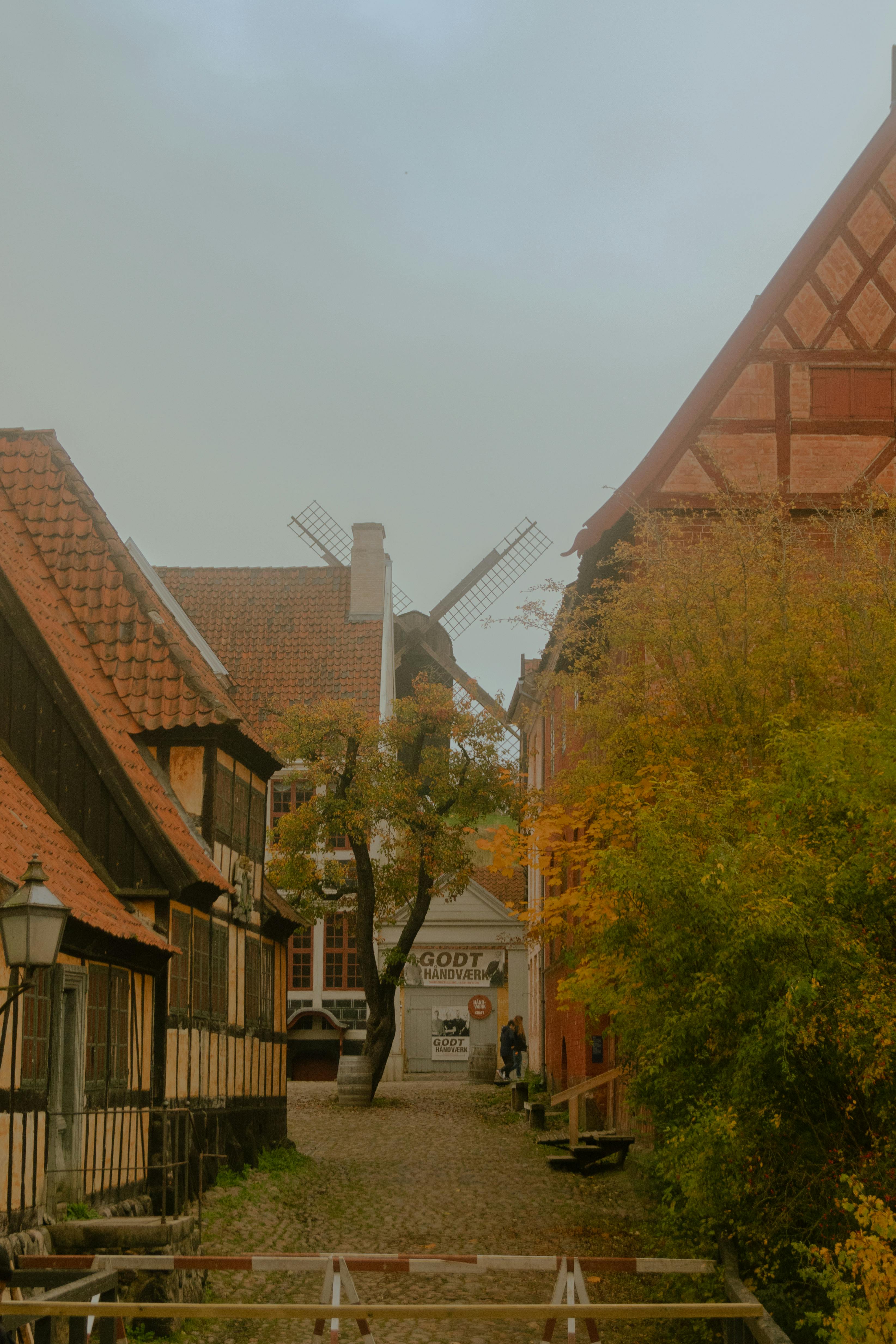 Windmill Near the Houses · Free Stock Photo