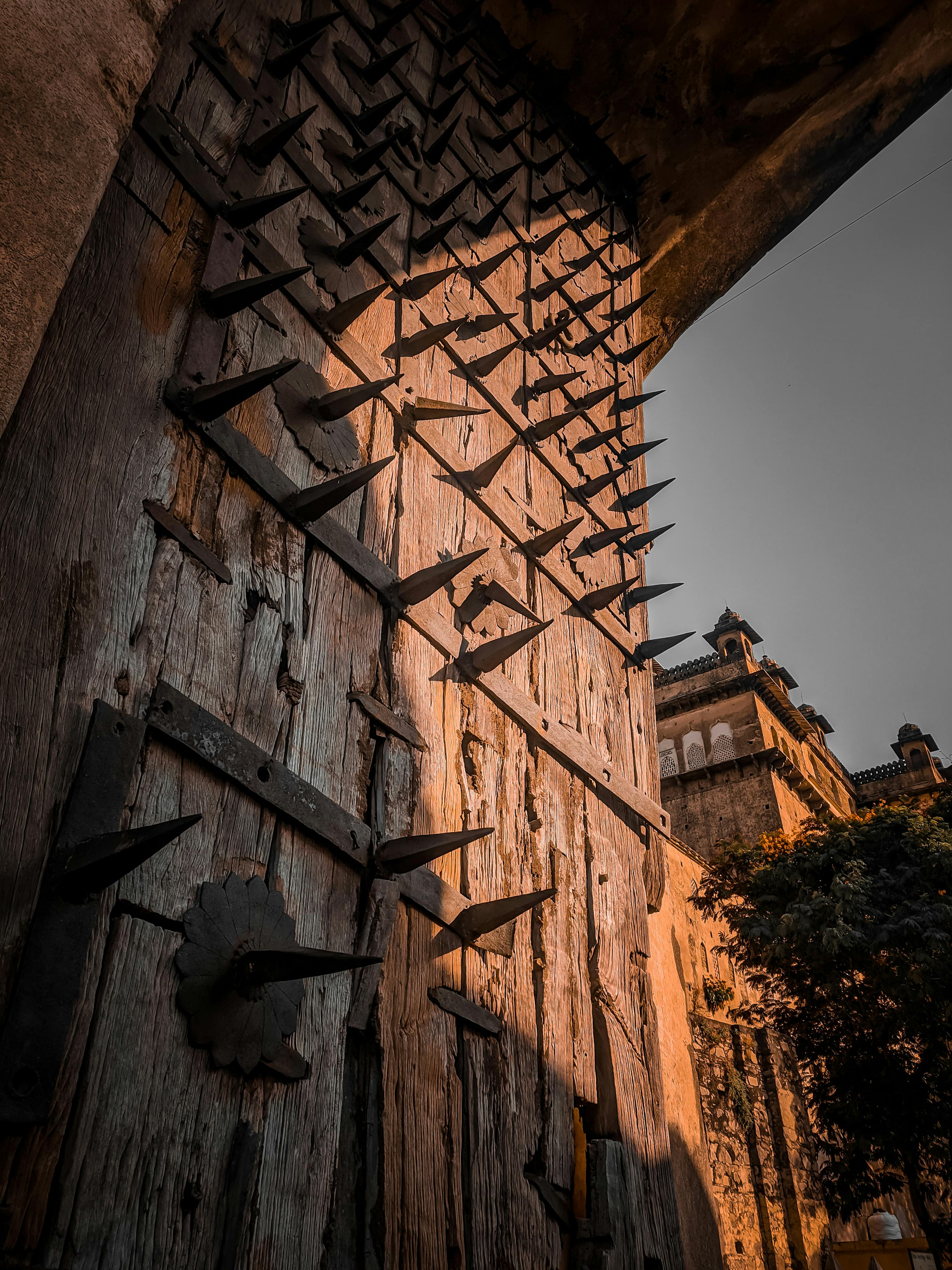 Low Angle Shot of a Spiky Wall of an Old Fortress · Free Stock Photo