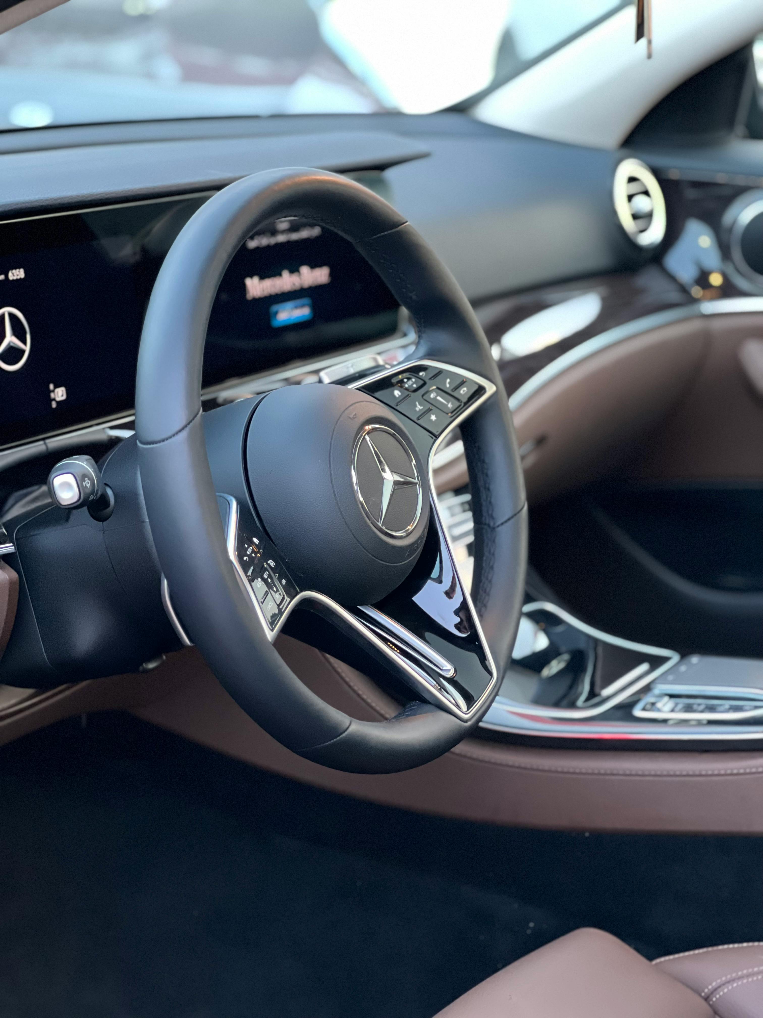 Black and Silver Mercedes Benz Steering Wheel · Free Stock Photo