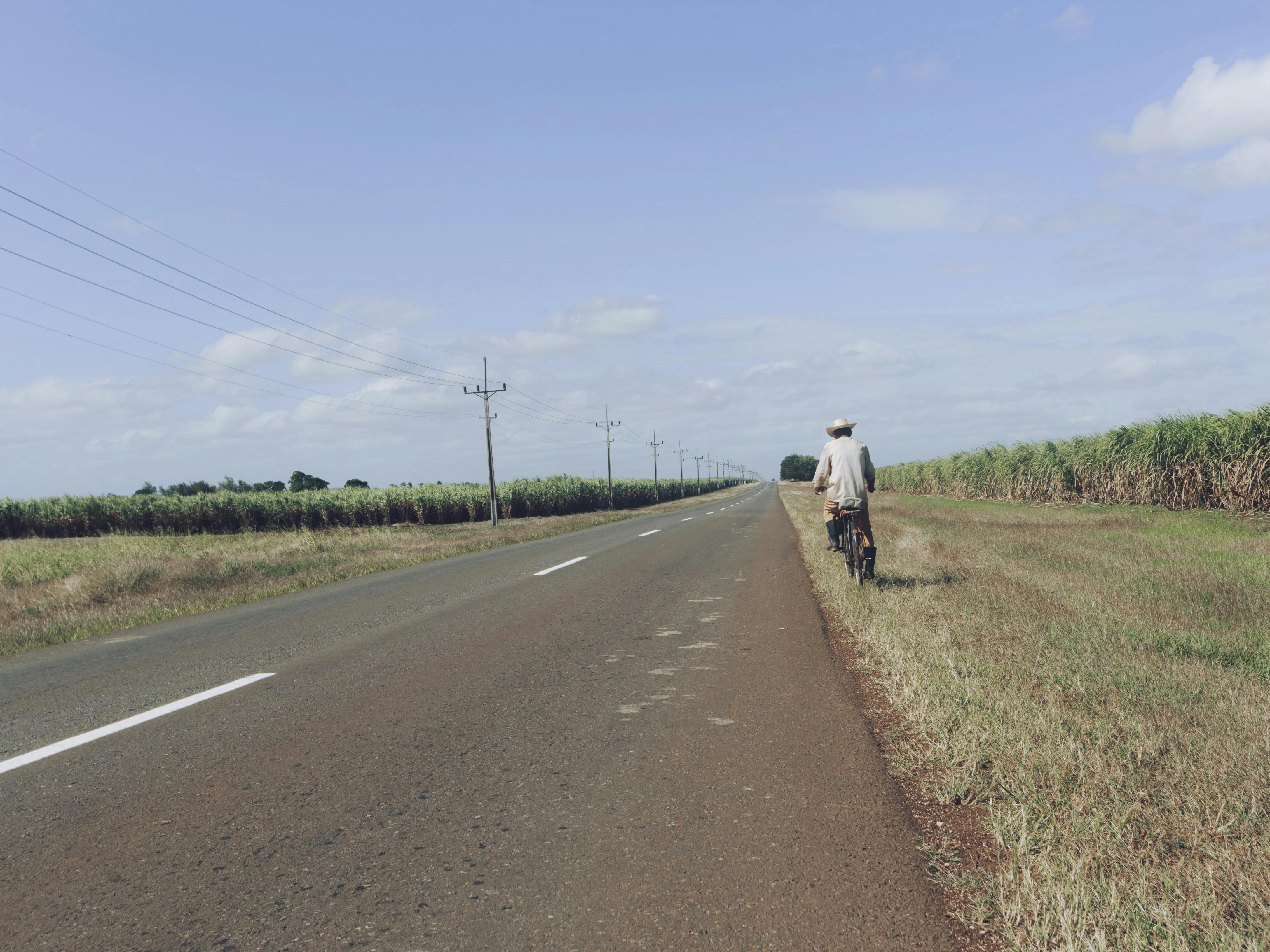Man in Dry Cropland in Mountains · Free Stock Photo