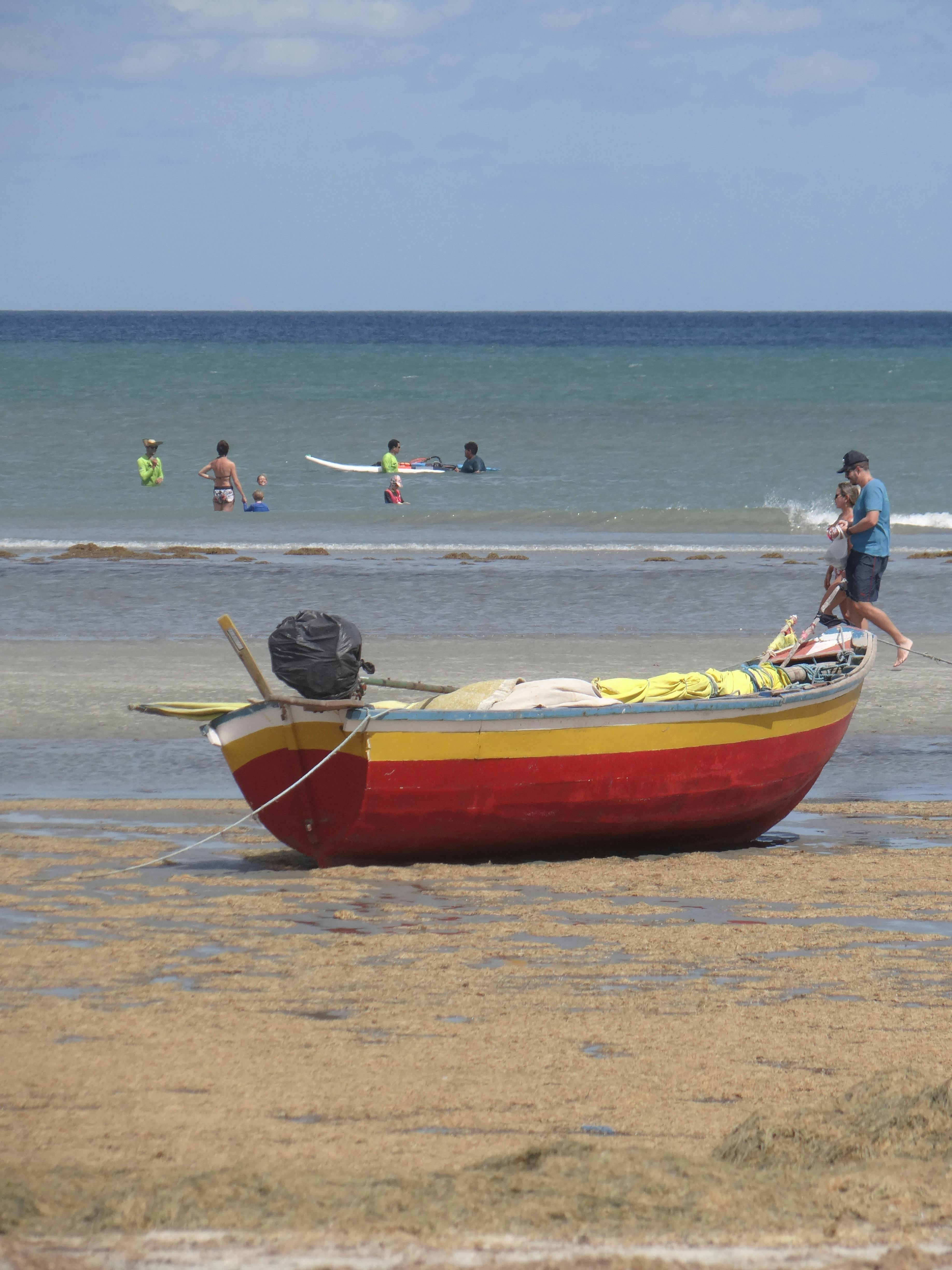 Red and Yellow Boat on the Shore · Free Stock Photo