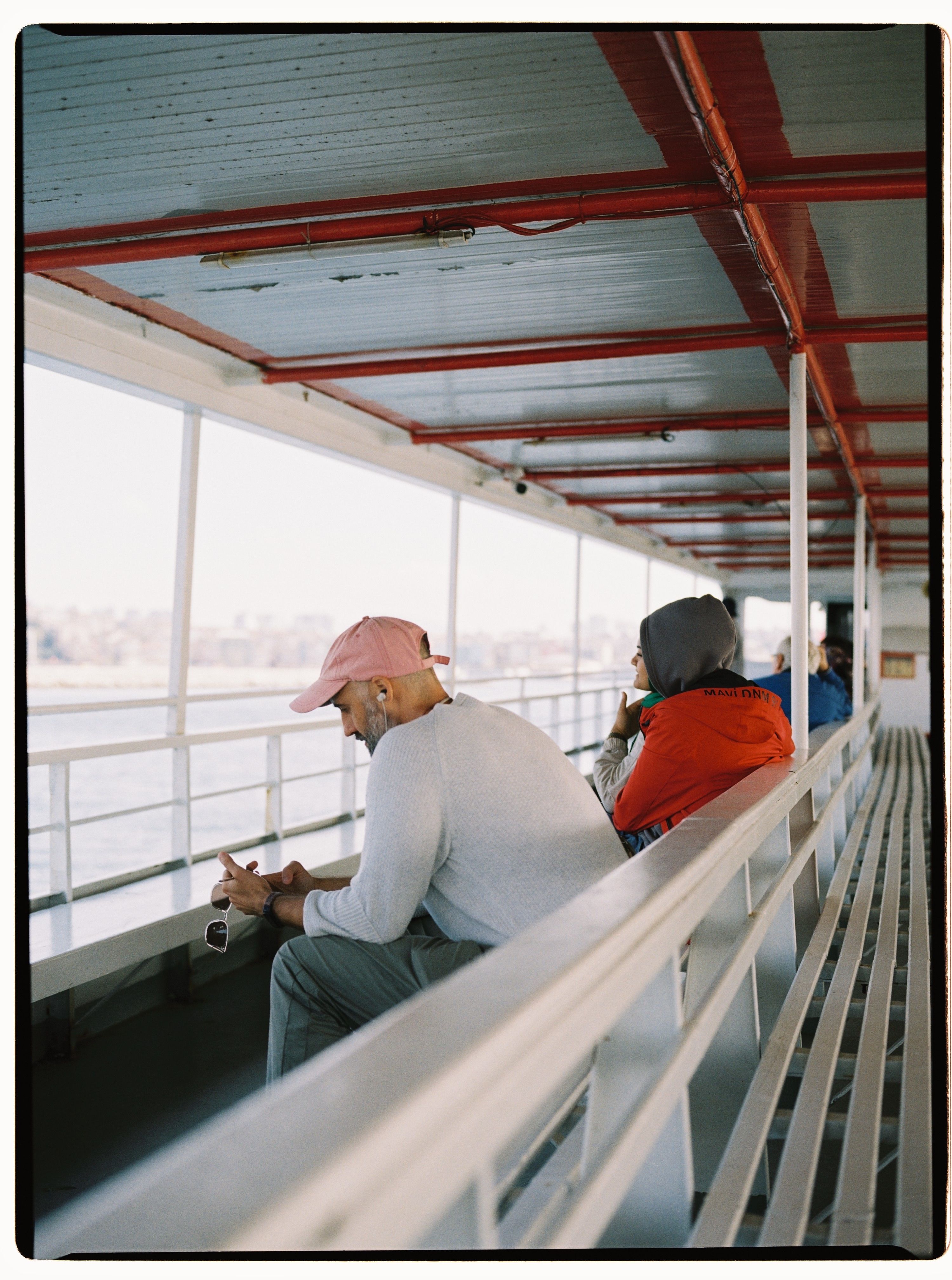 Back View of a Man on a Ferry Boat · Free Stock Photo