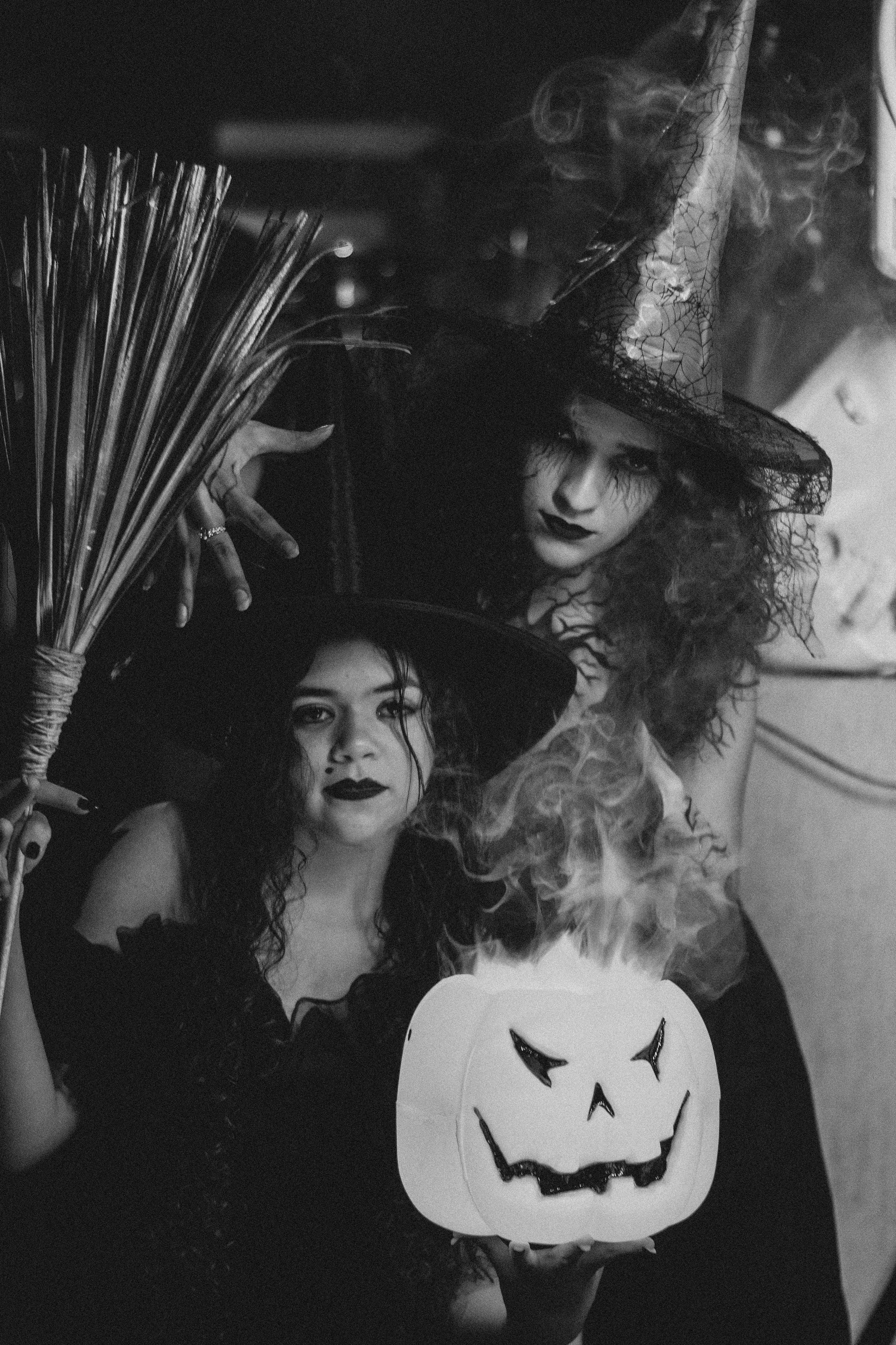 A Grayscale of Women in Witch Costumes · Free Stock Photo