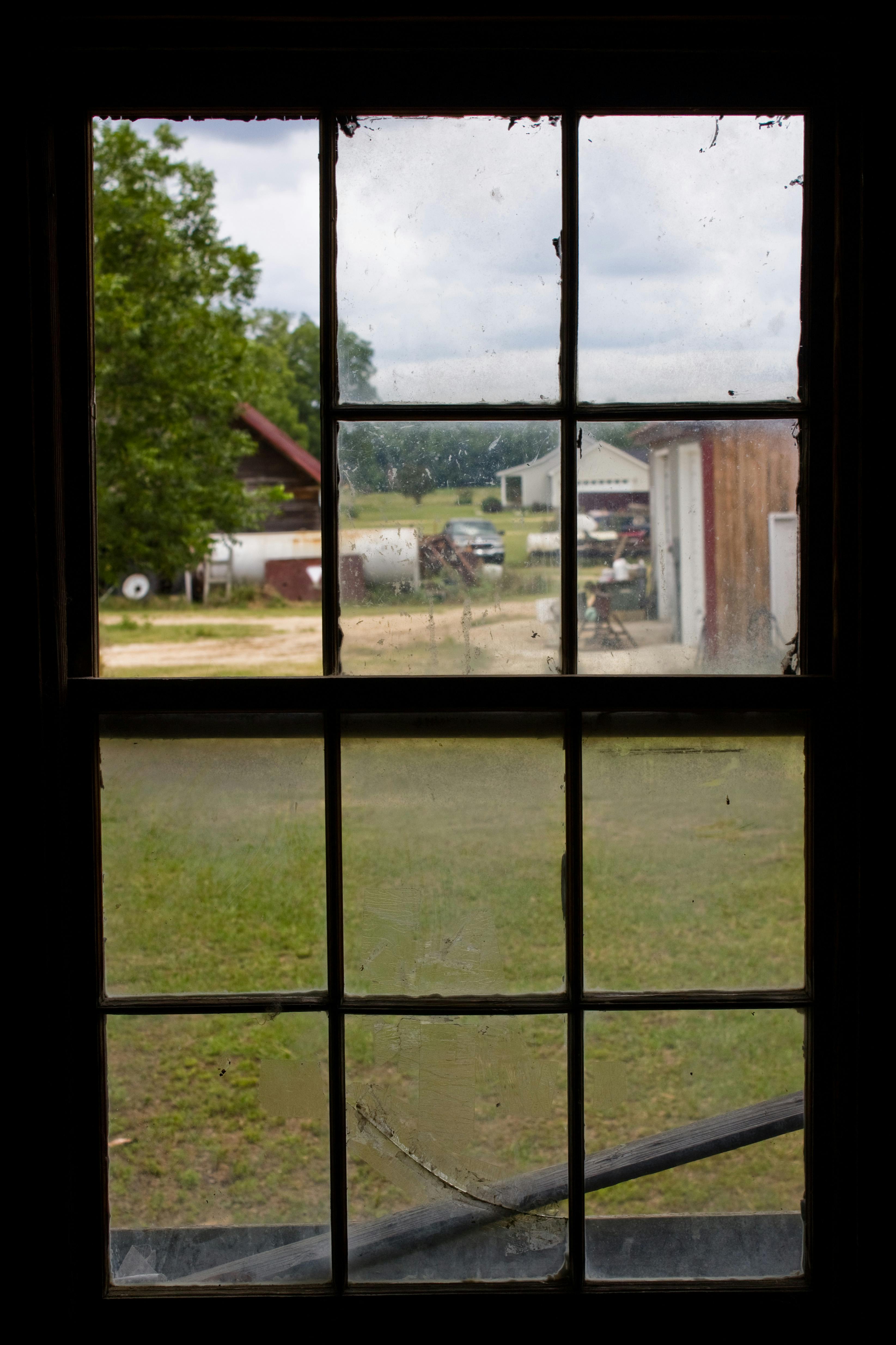 Farm behind Window · Free Stock Photo