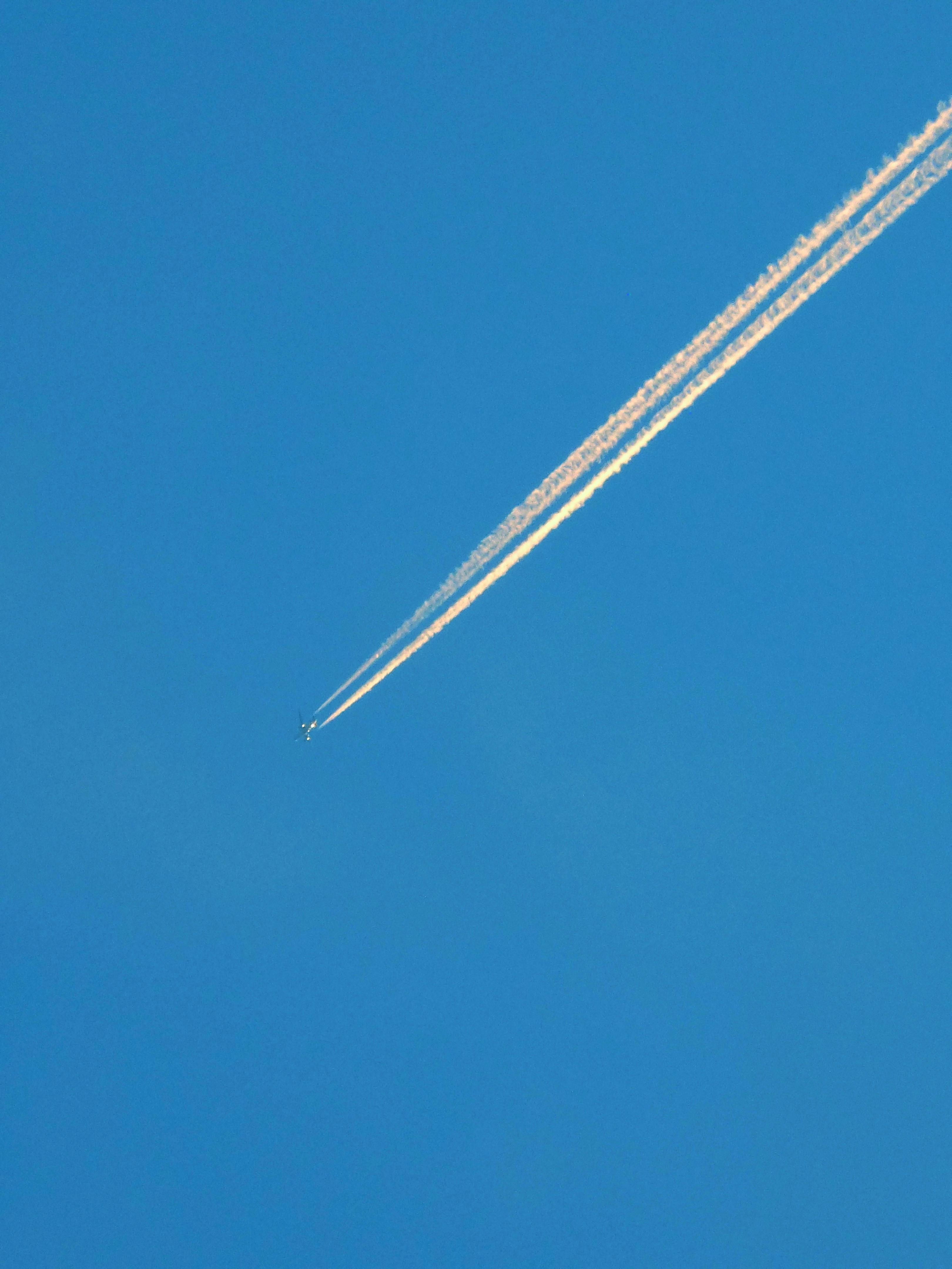 Trace of Airplane on Clear Sky · Free Stock Photo