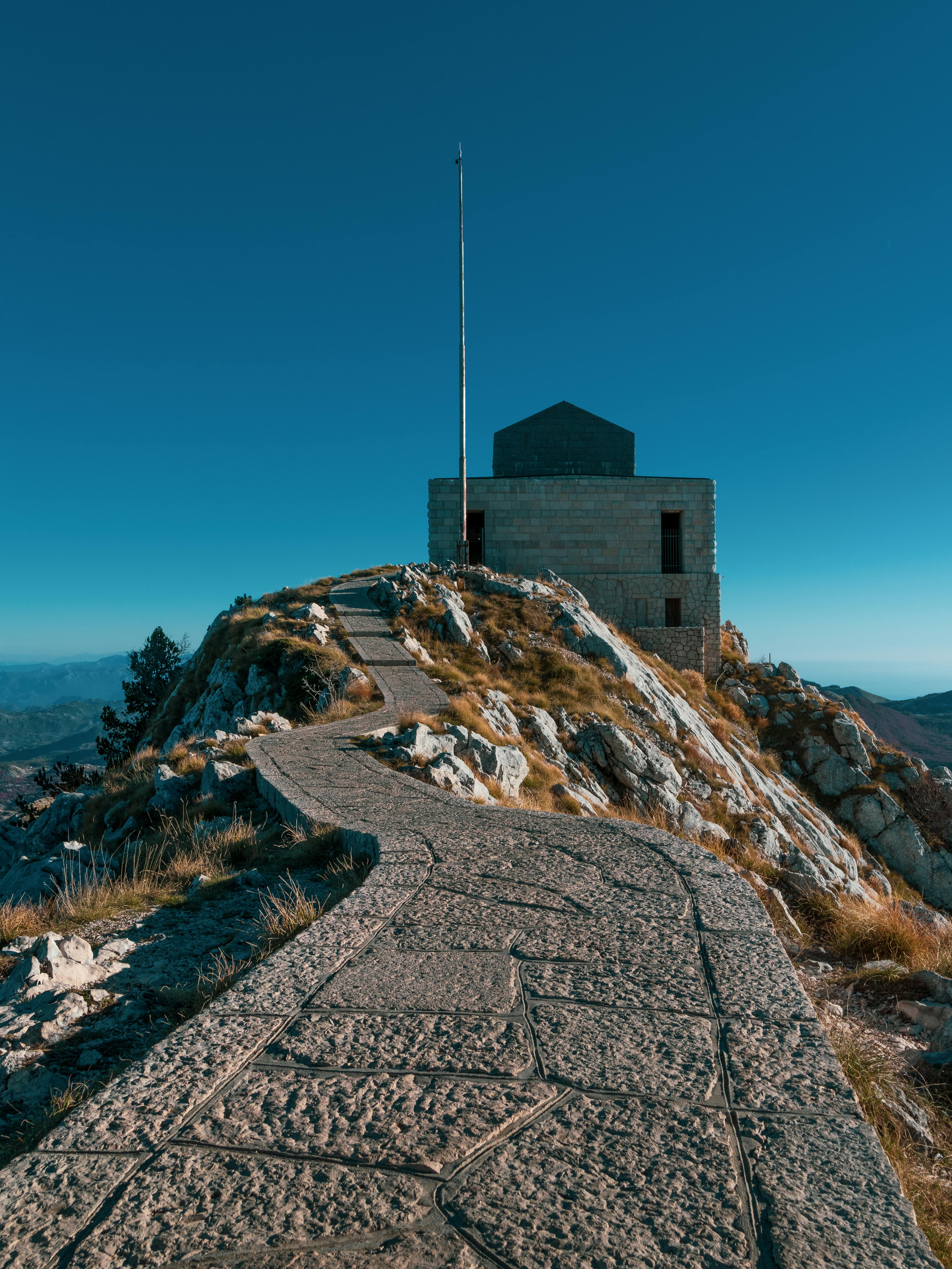Path Leading into Building on Mountain Peak · Free Stock Photo
