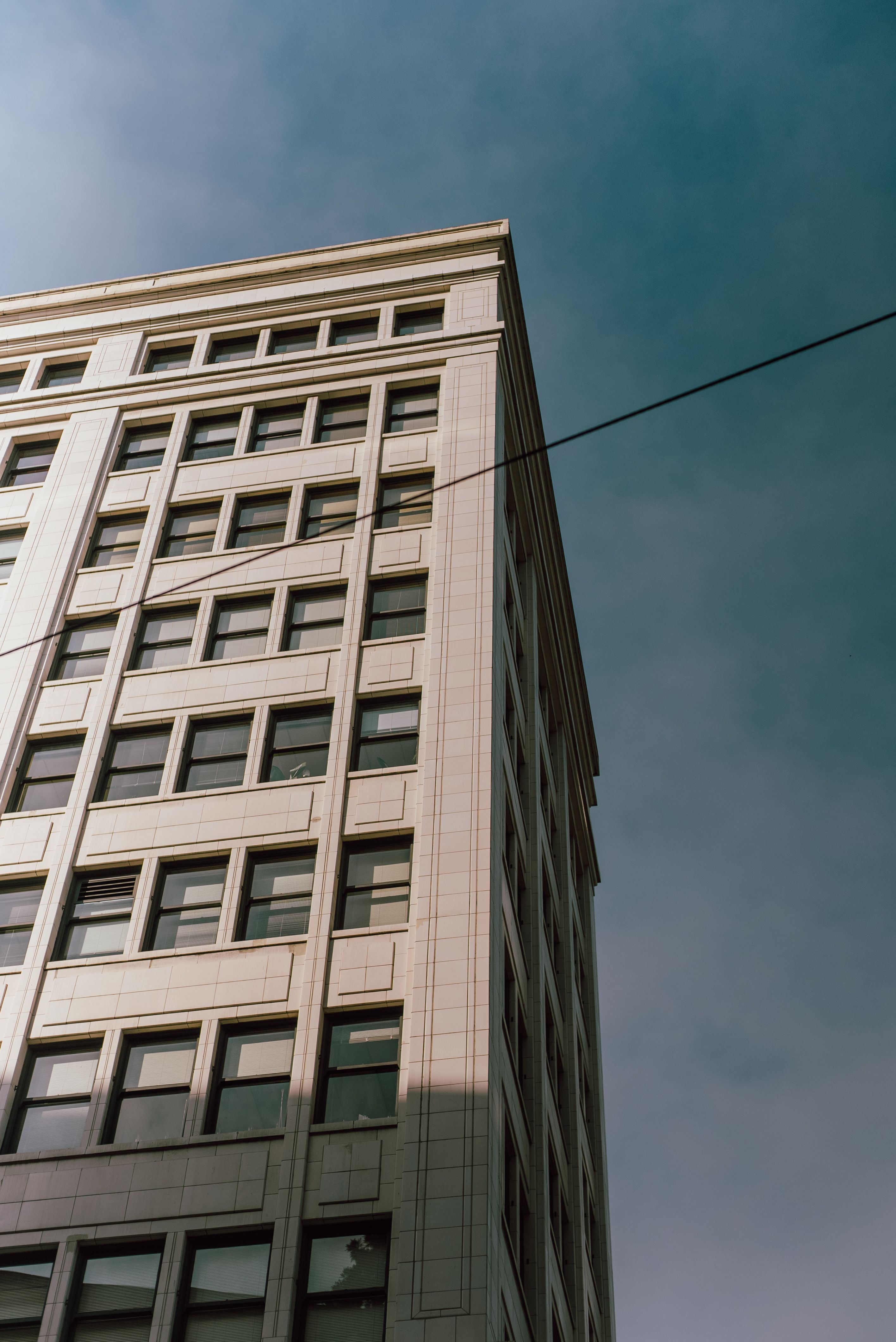 White Building Under Blue Sky · Free Stock Photo