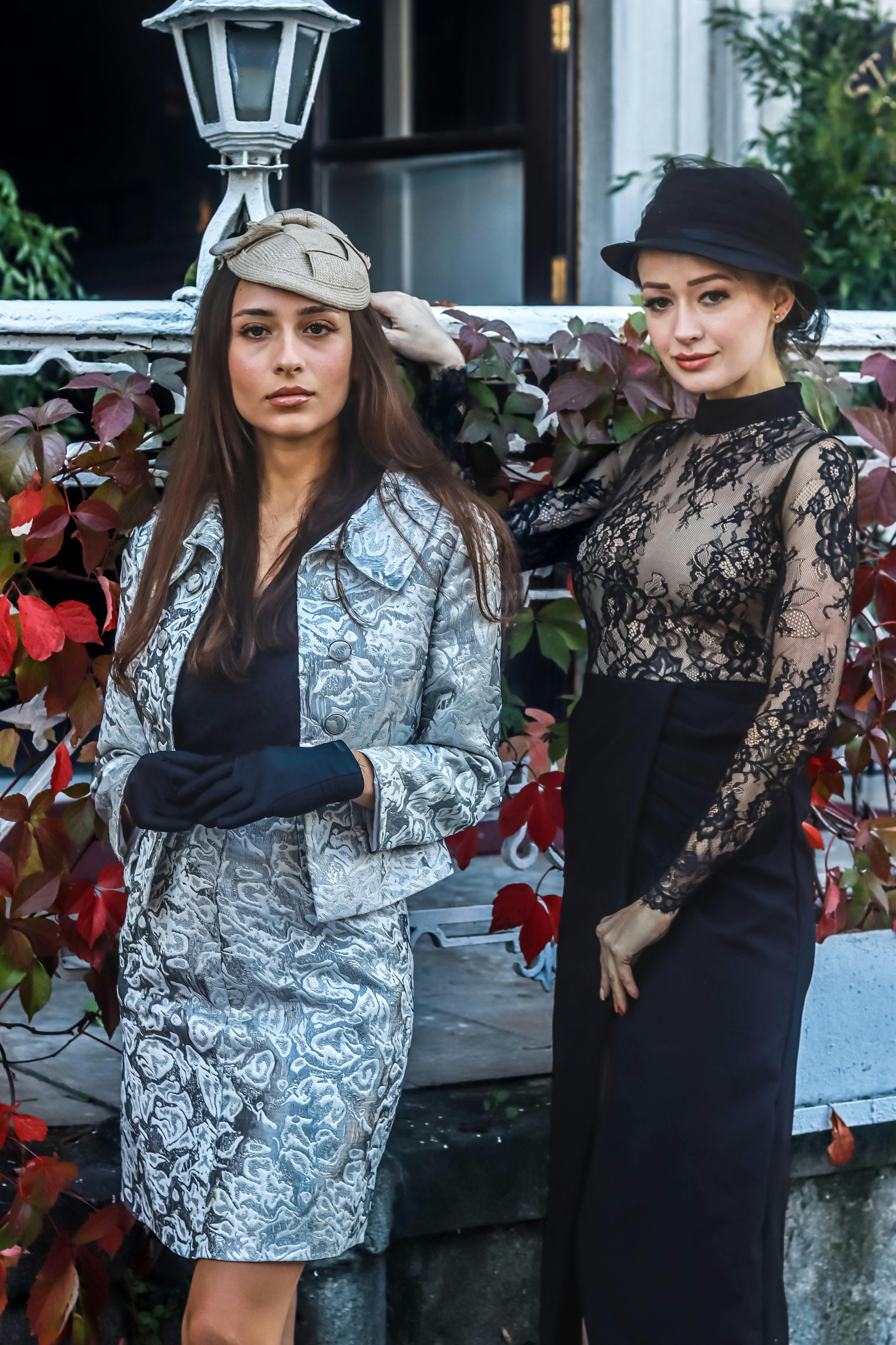 Elegant Young Women Posing Outside · Free Stock Photo