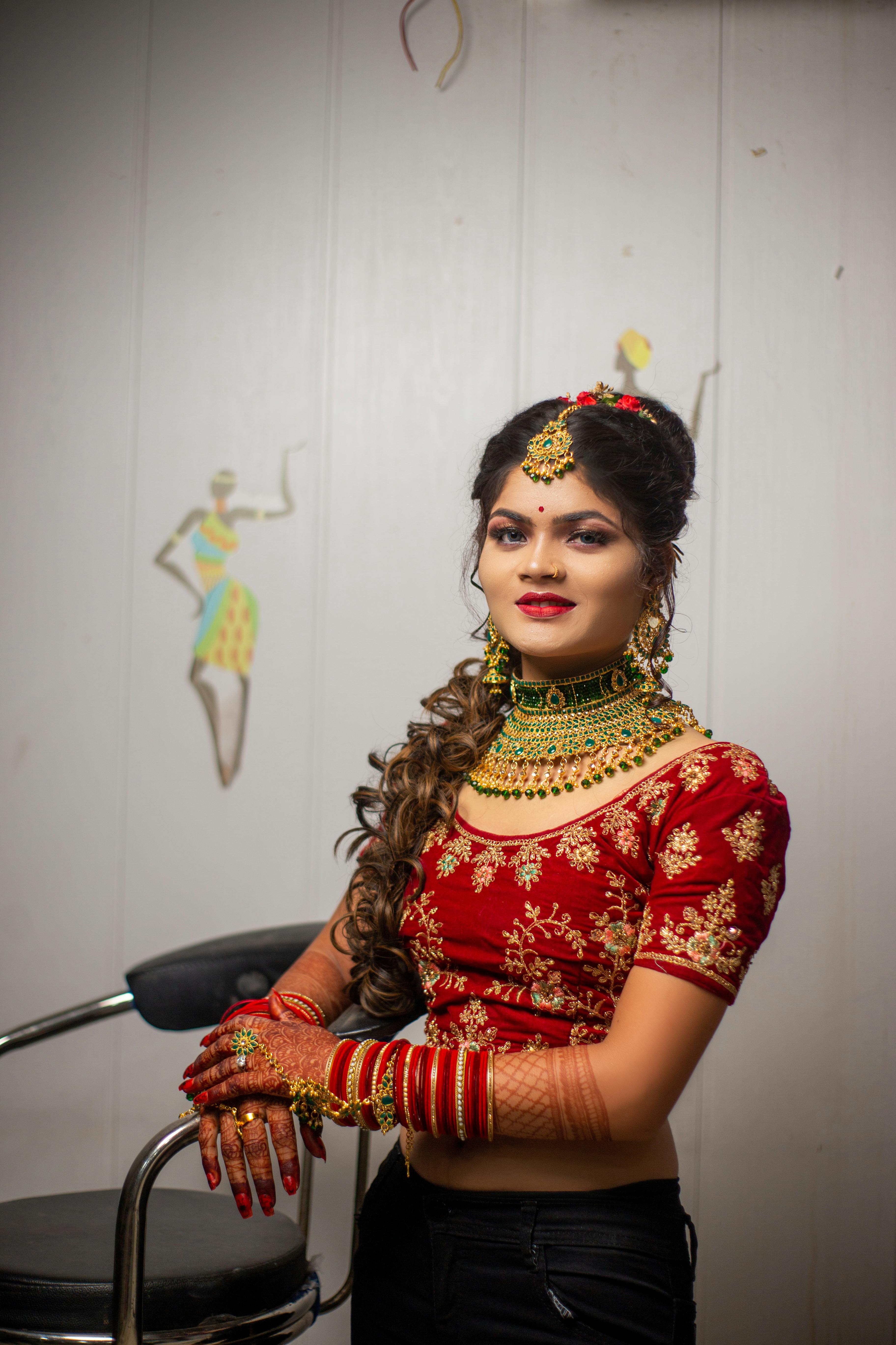 Gorgeous Indian woman with piercing and bright makeup · Free Stock Photo