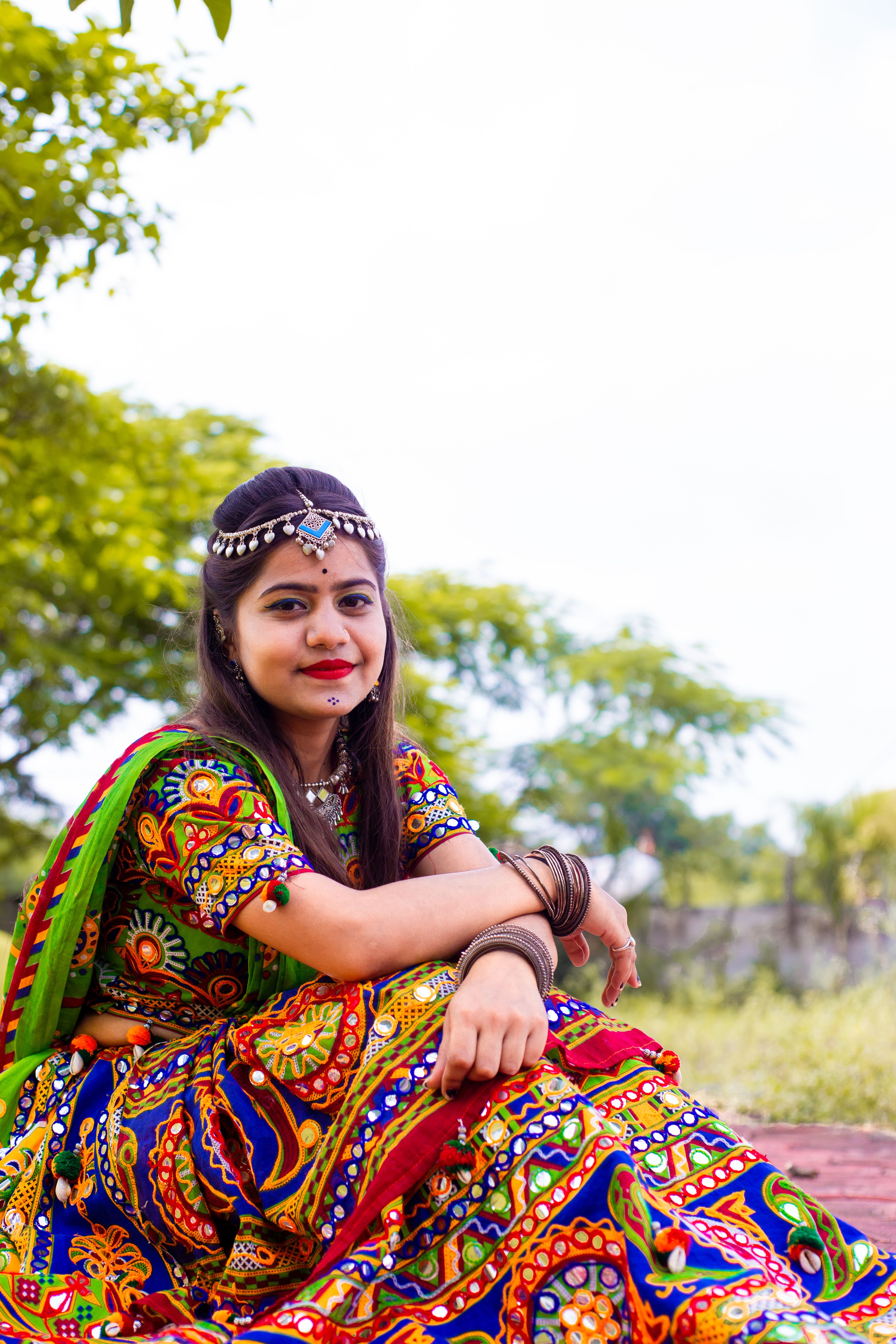 A Woman Wearing a Colorful Long Dress · Free Stock Photo