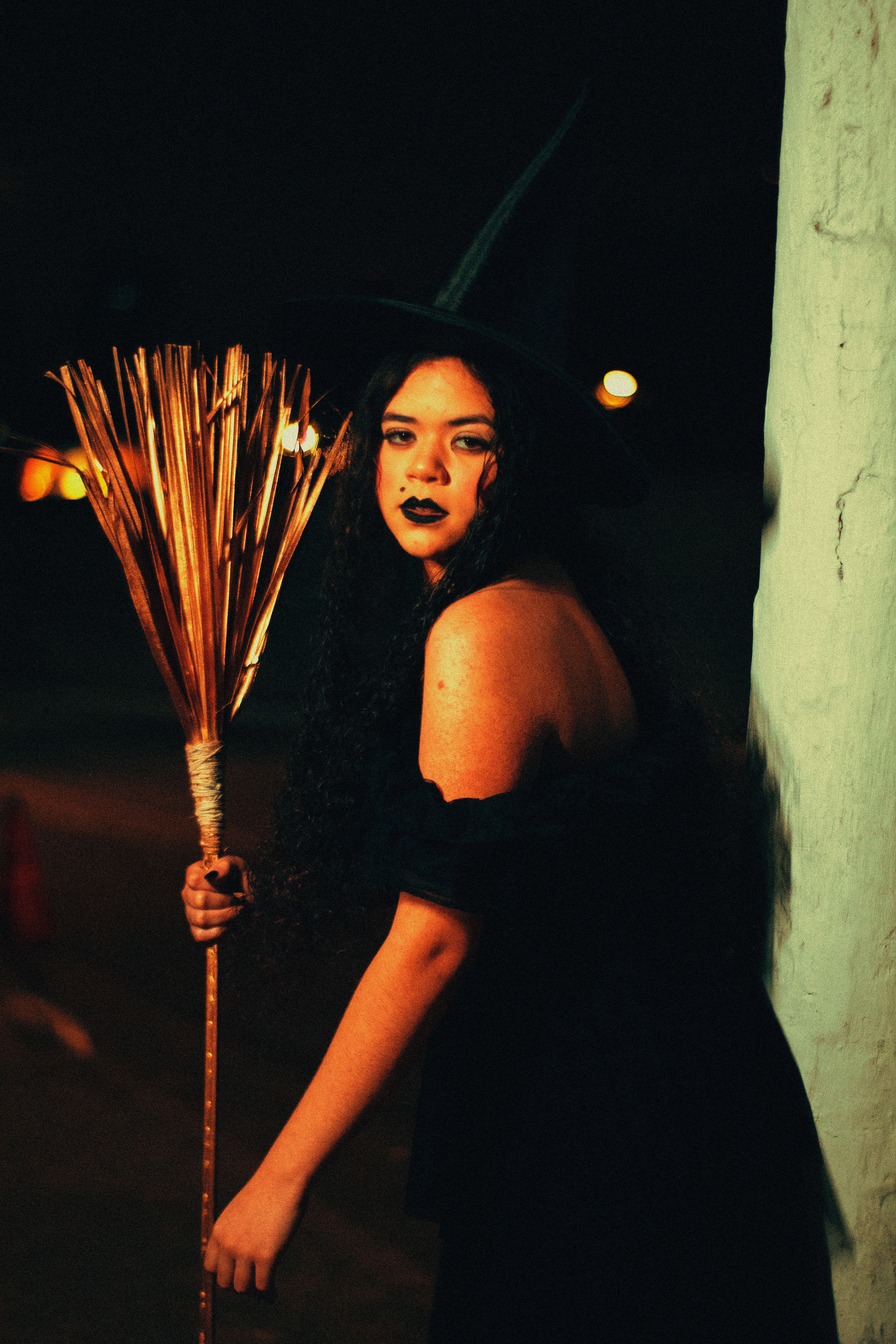 Witch Kneeling on Sand · Free Stock Photo