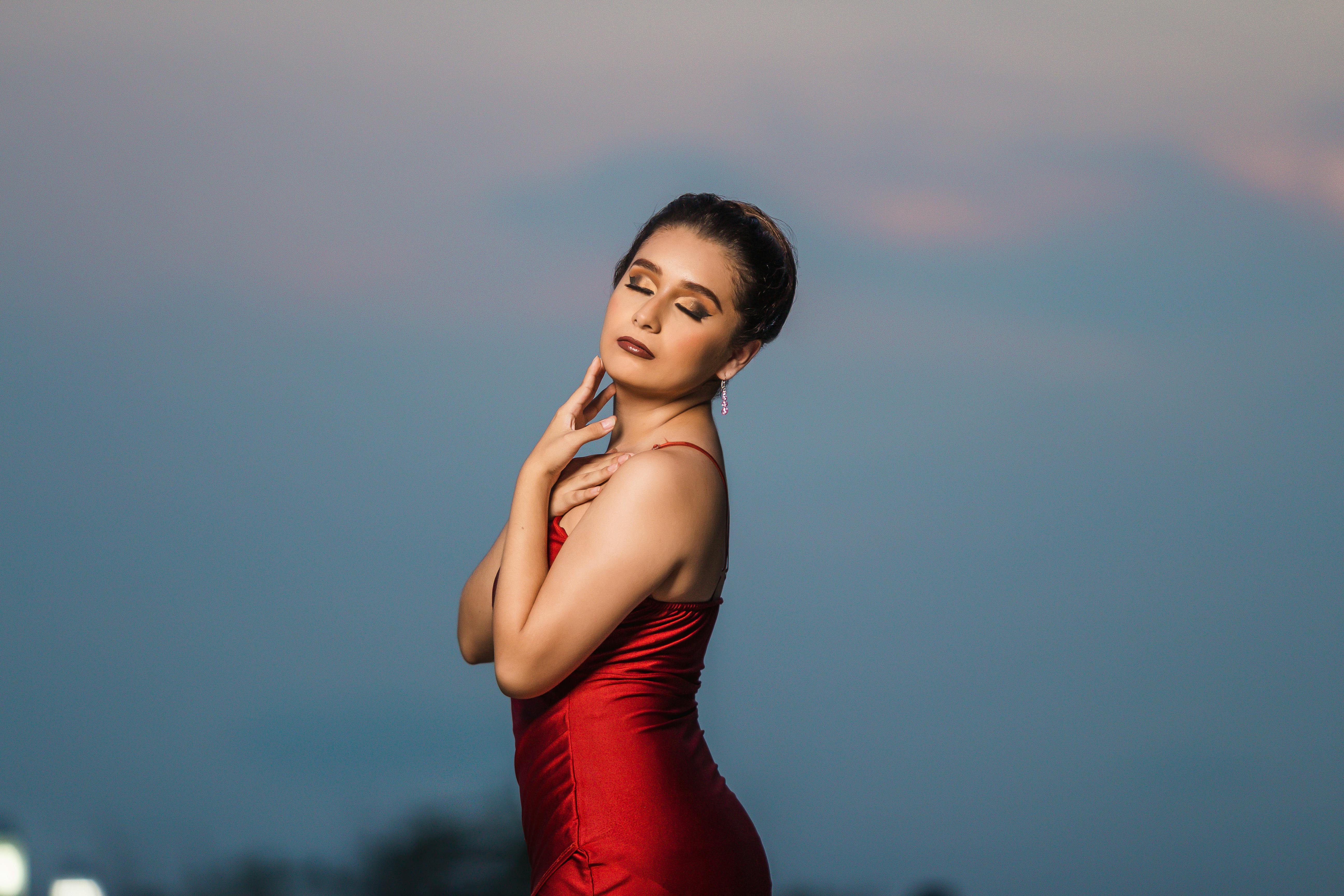 Beautiful Woman in Red Dress Posing · Free Stock Photo