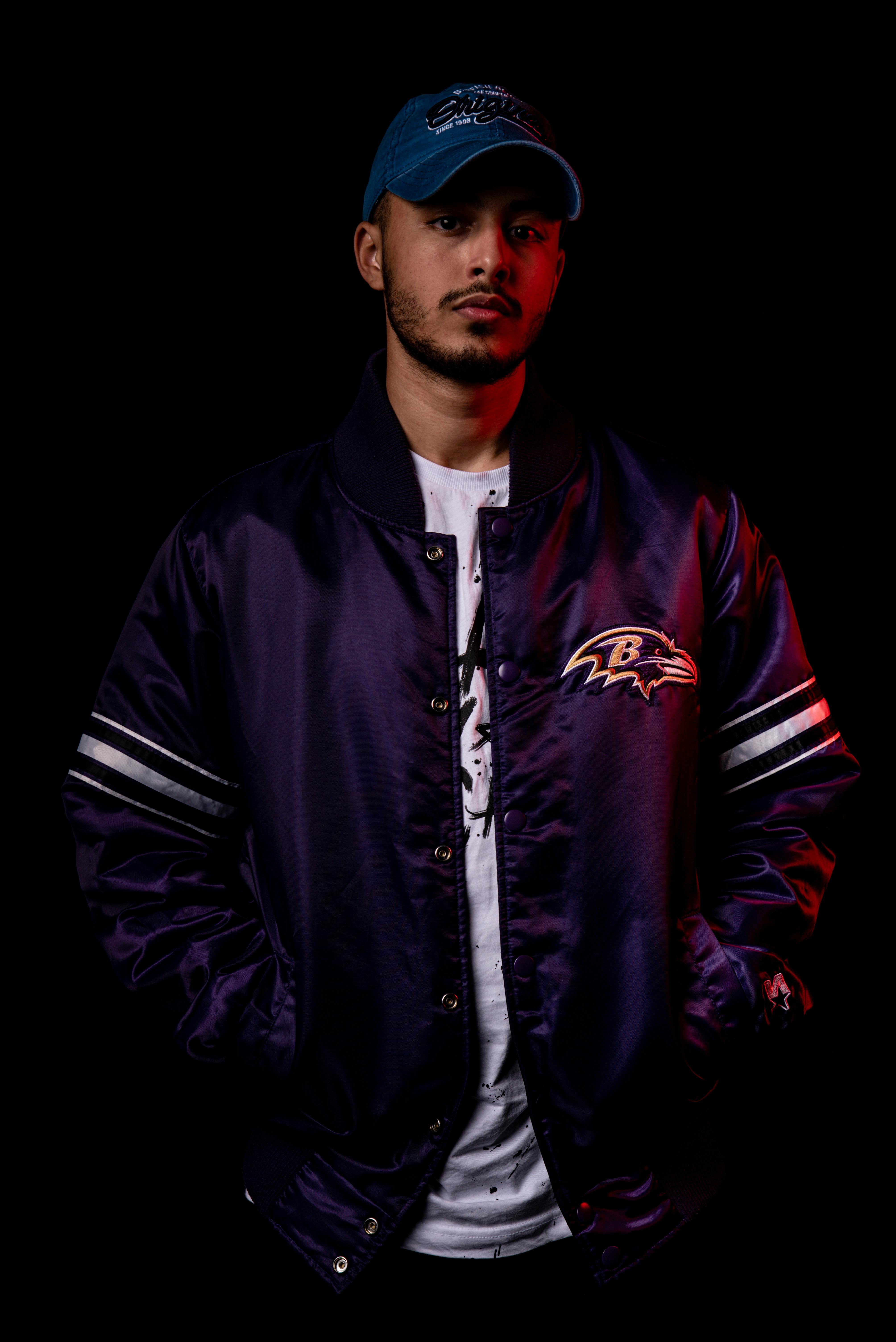 Young Fashionable Man Wearing a Cap Backwards · Free Stock Photo