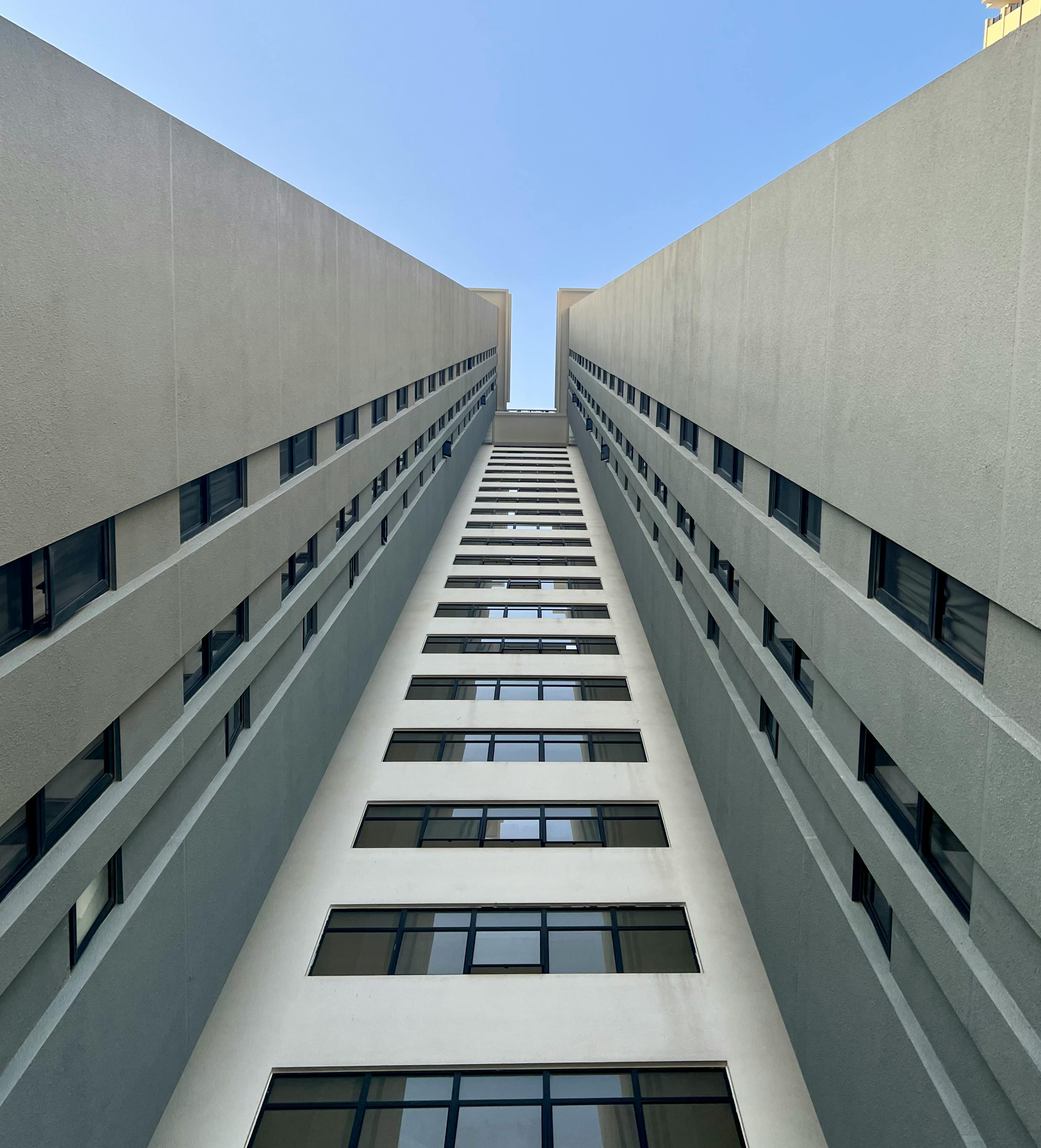 Grayscale Photo of High Rise Building · Free Stock Photo