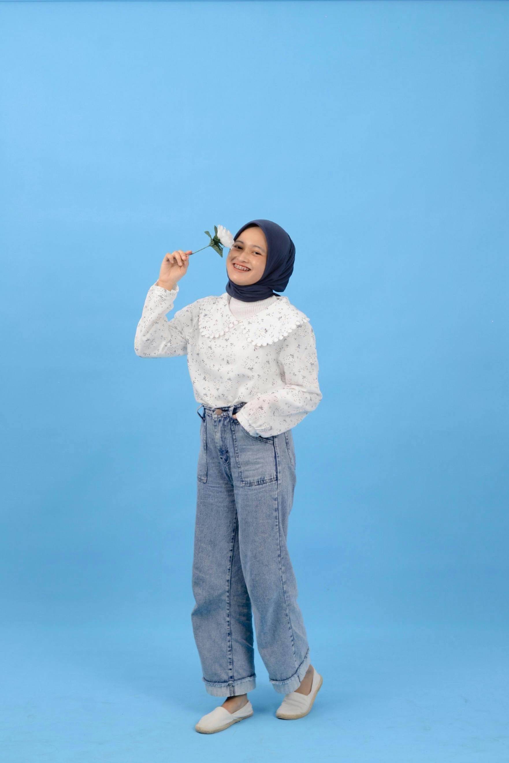 A Young Woman Modeling in Modesty Clothing · Free Stock Photo