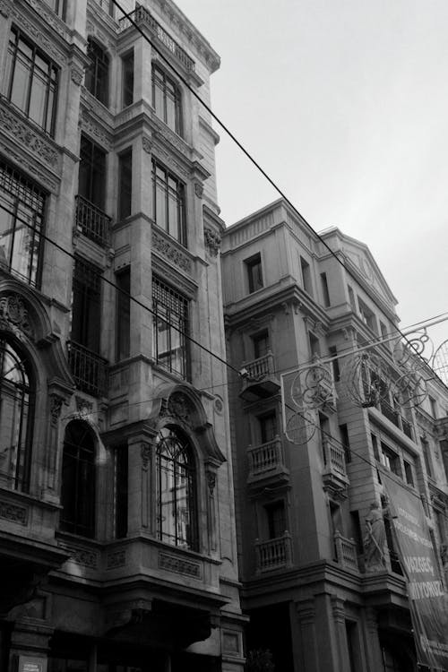 Grayscale Photo of Concrete Buildings · Free Stock Photo Grayscale Photo of Concrete Buildings · Free Stock Photo