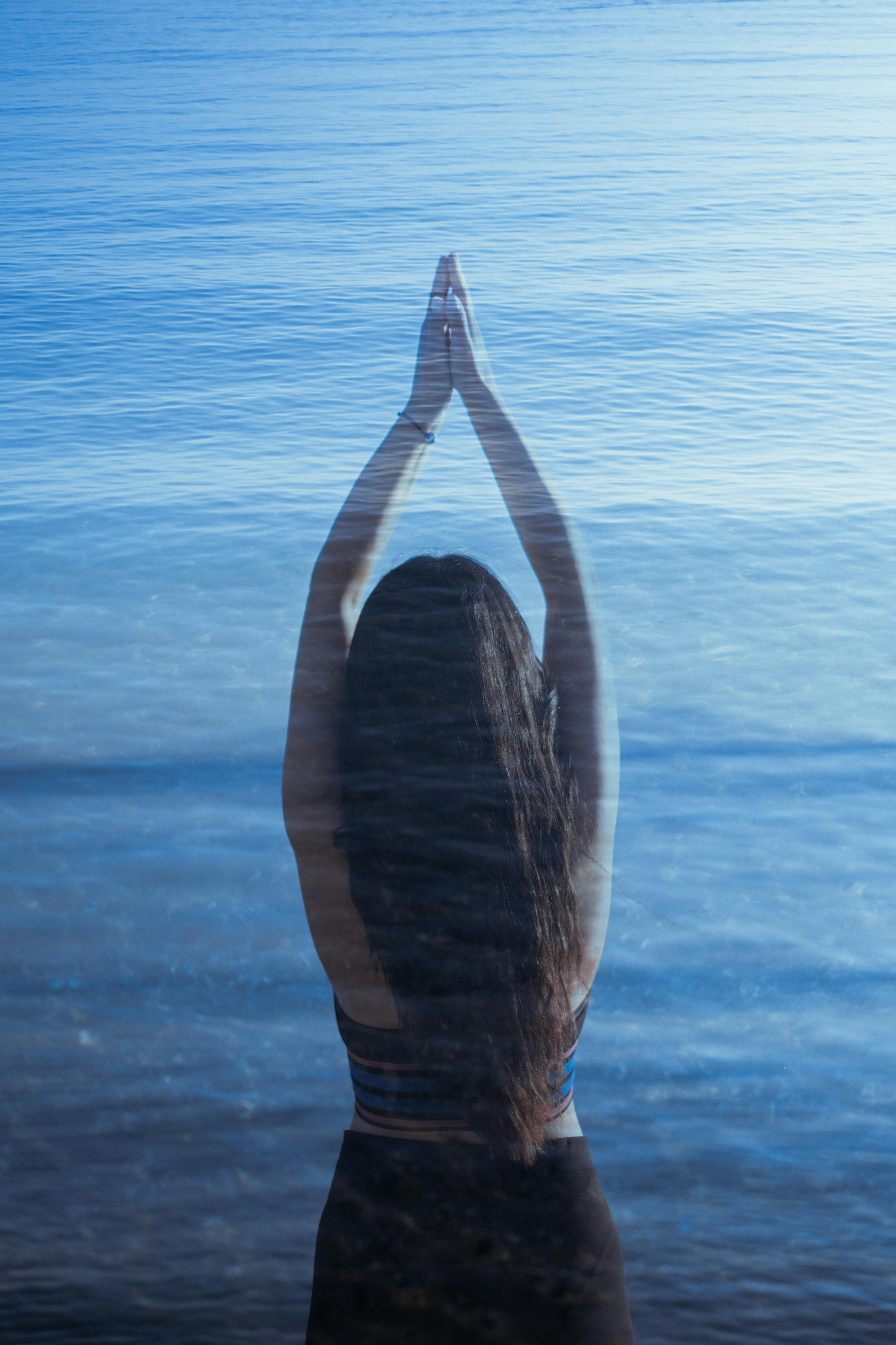 Reflection of a Woman on the Water · Free Stock Photo