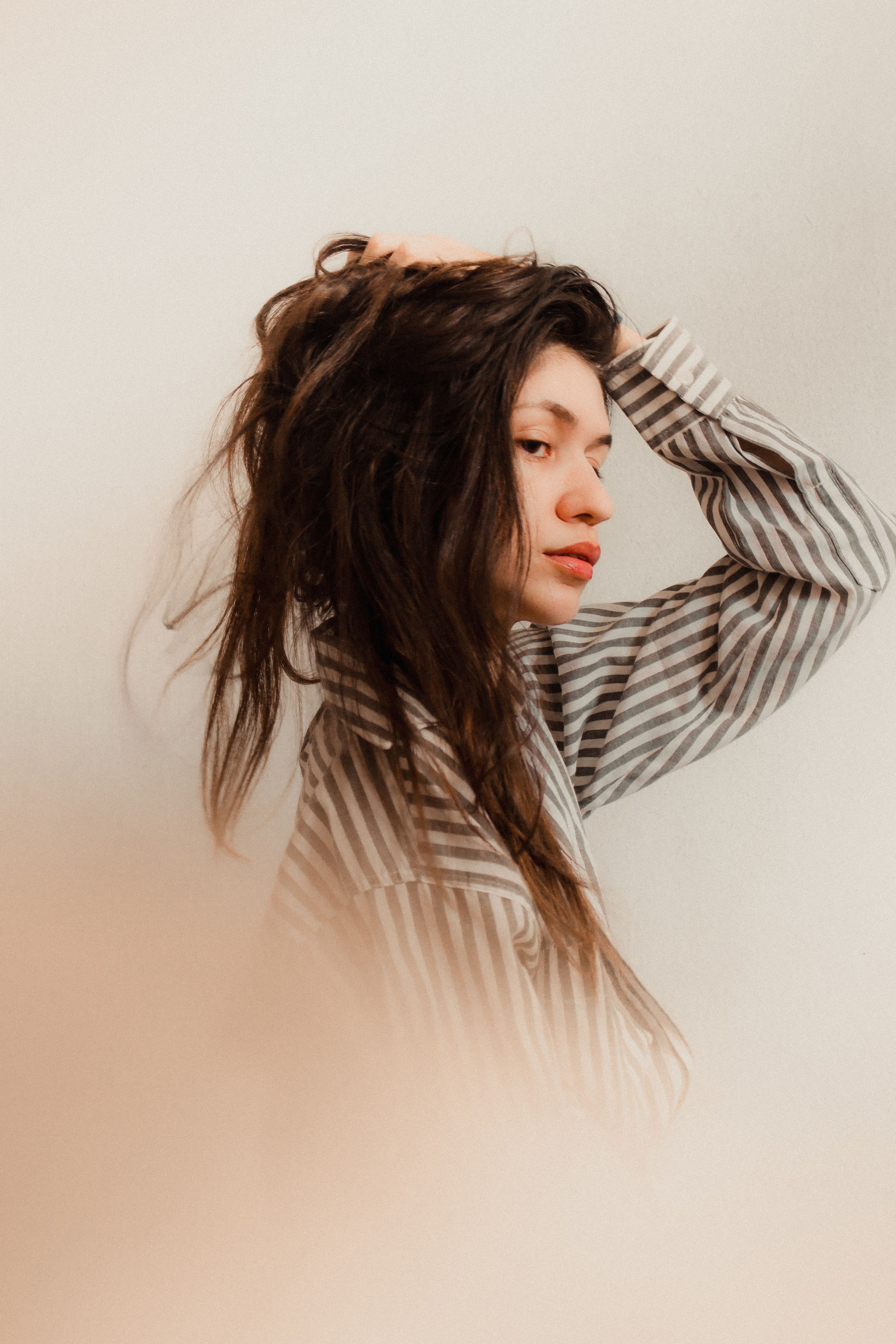 A Woman with a Messy hair · Free Stock Photo